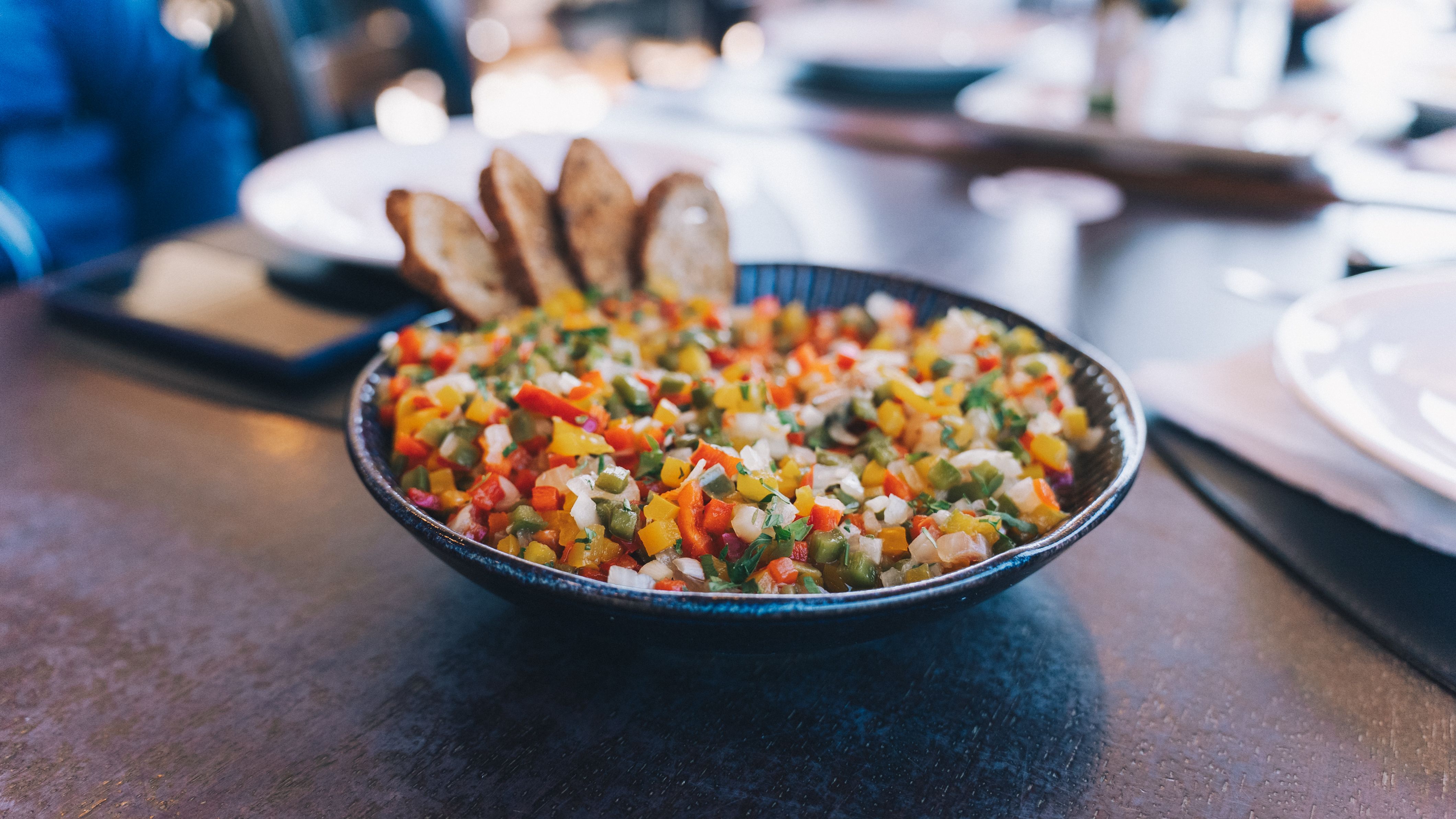 Colorful Vegetable Salsa in Bowl on Table · Free Stock Photo