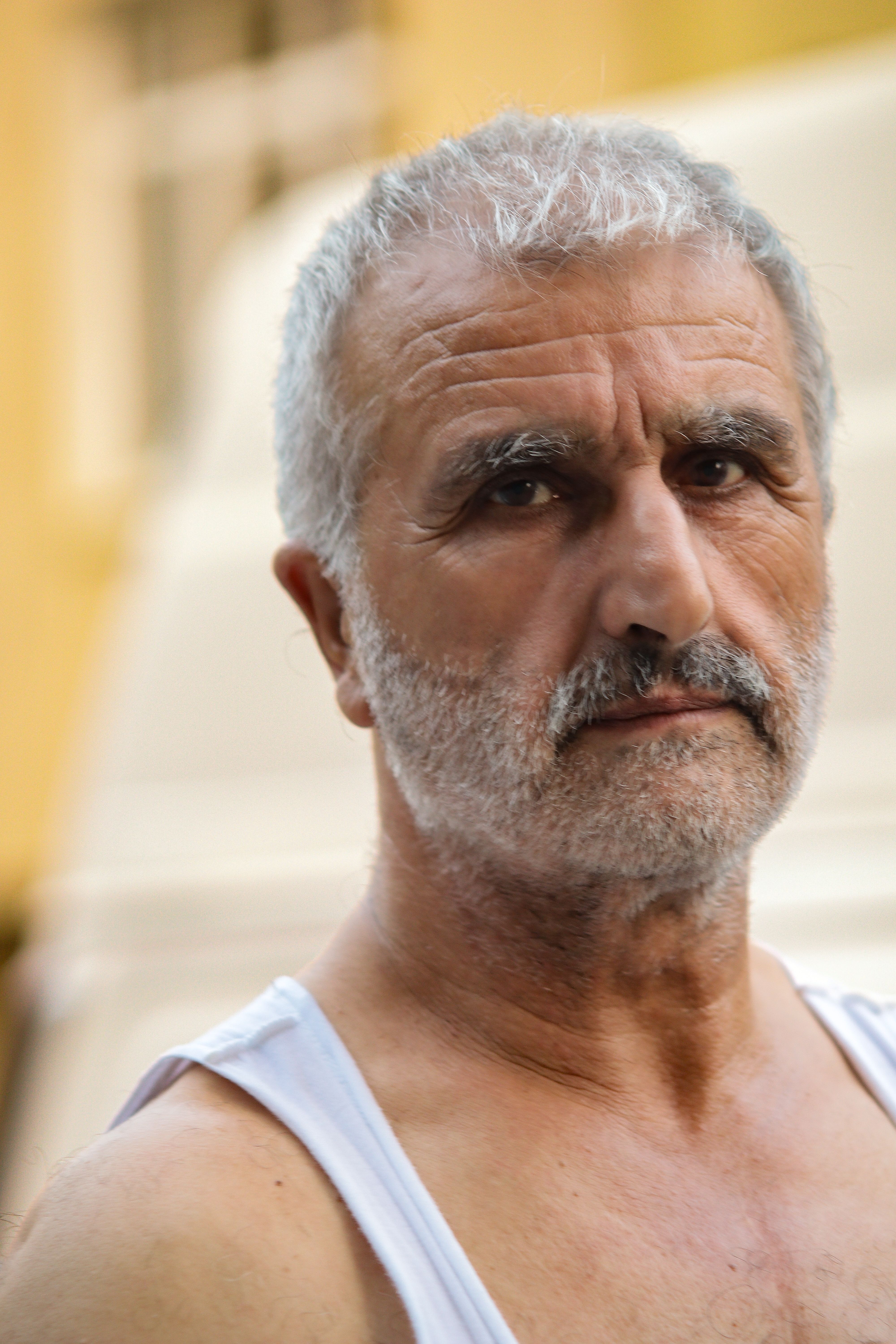 Portrait of a Smiling Middle-Aged Man Outdoors · Free Stock Photo