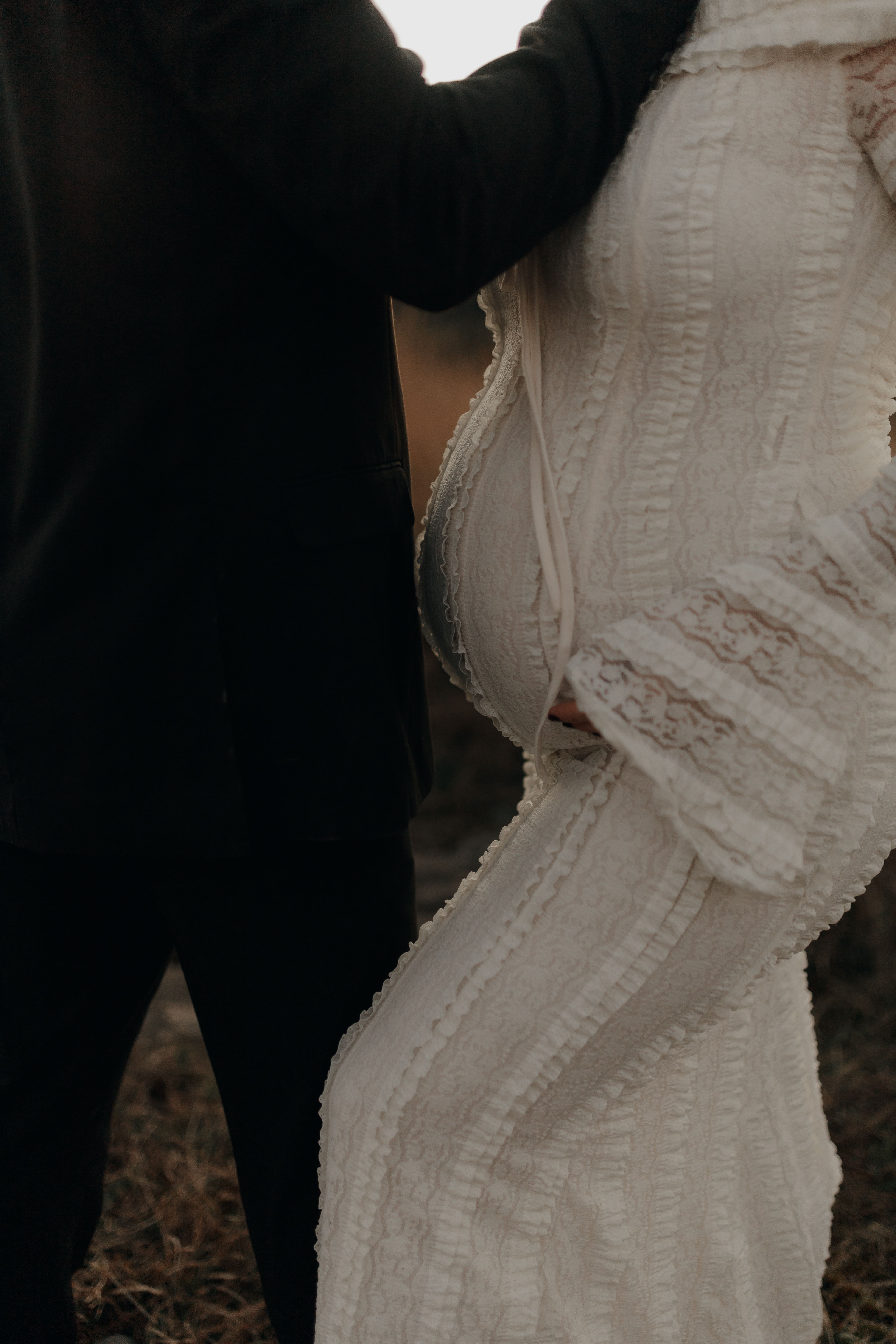 Elegant Maternity Photoshoot in Evening Light · Free Stock Photo