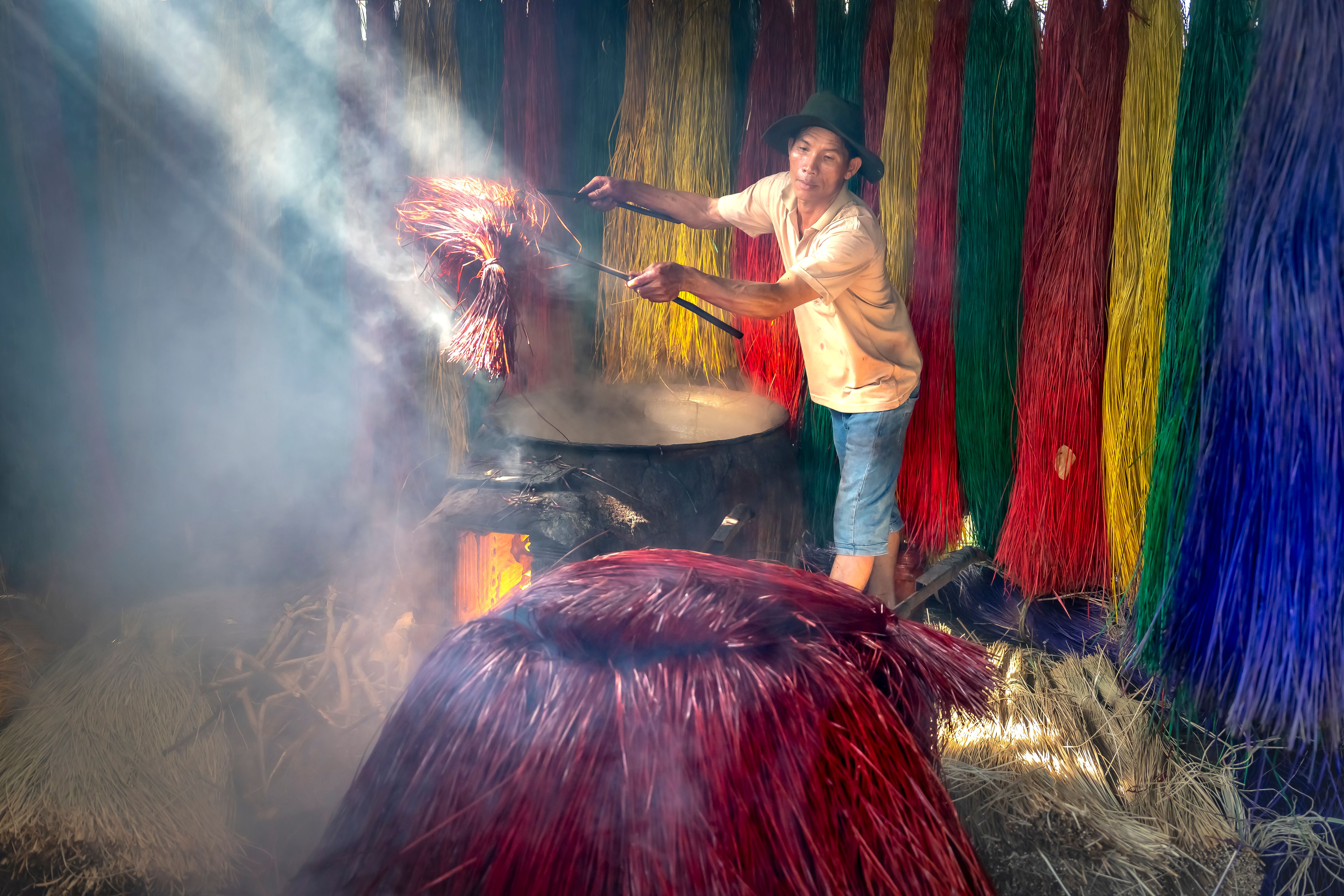 Colorful Traditional Reed Dyeing Process · Free Stock Photo