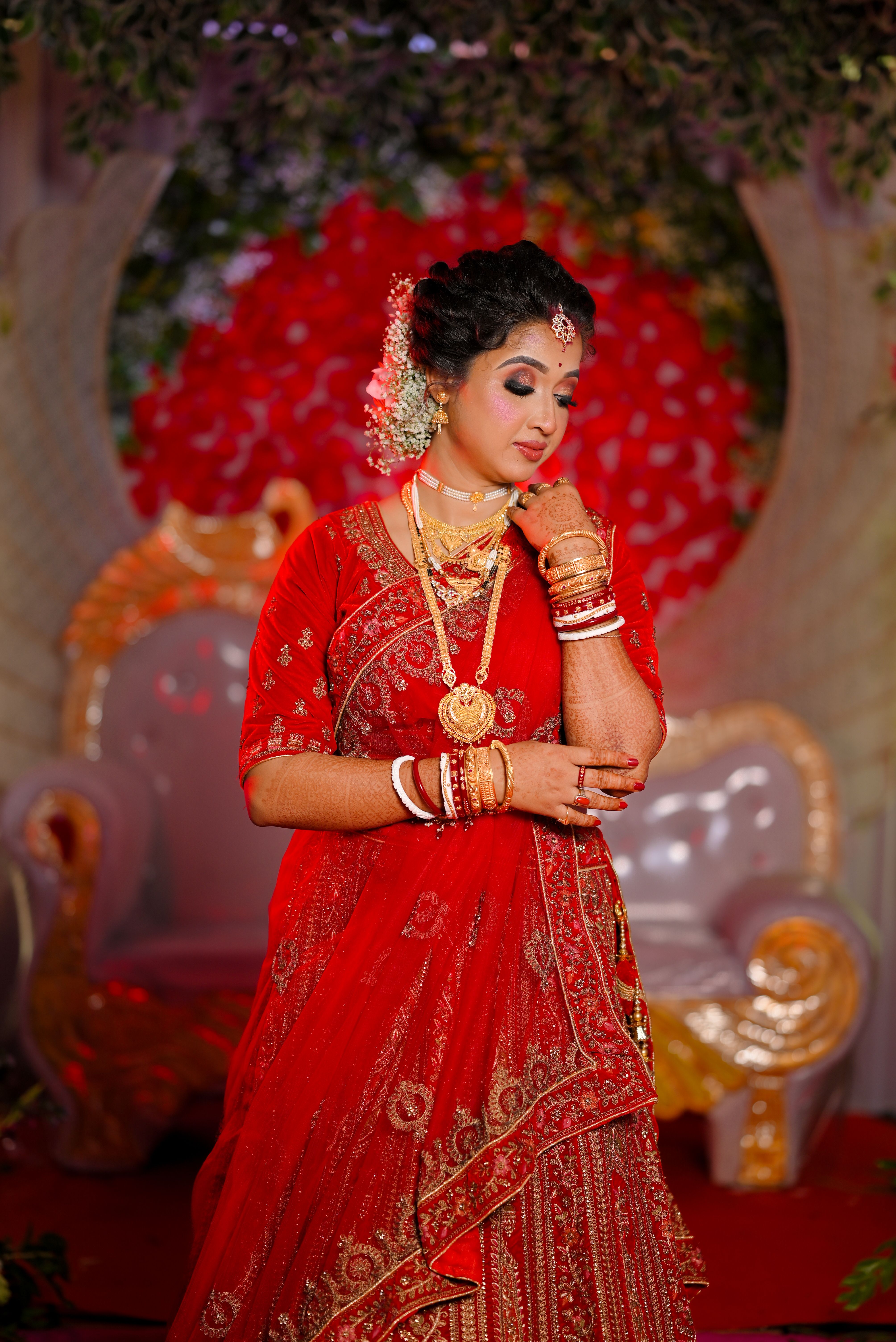 Elegant Traditional Bengali Bride in Red Saree · Free Stock Photo