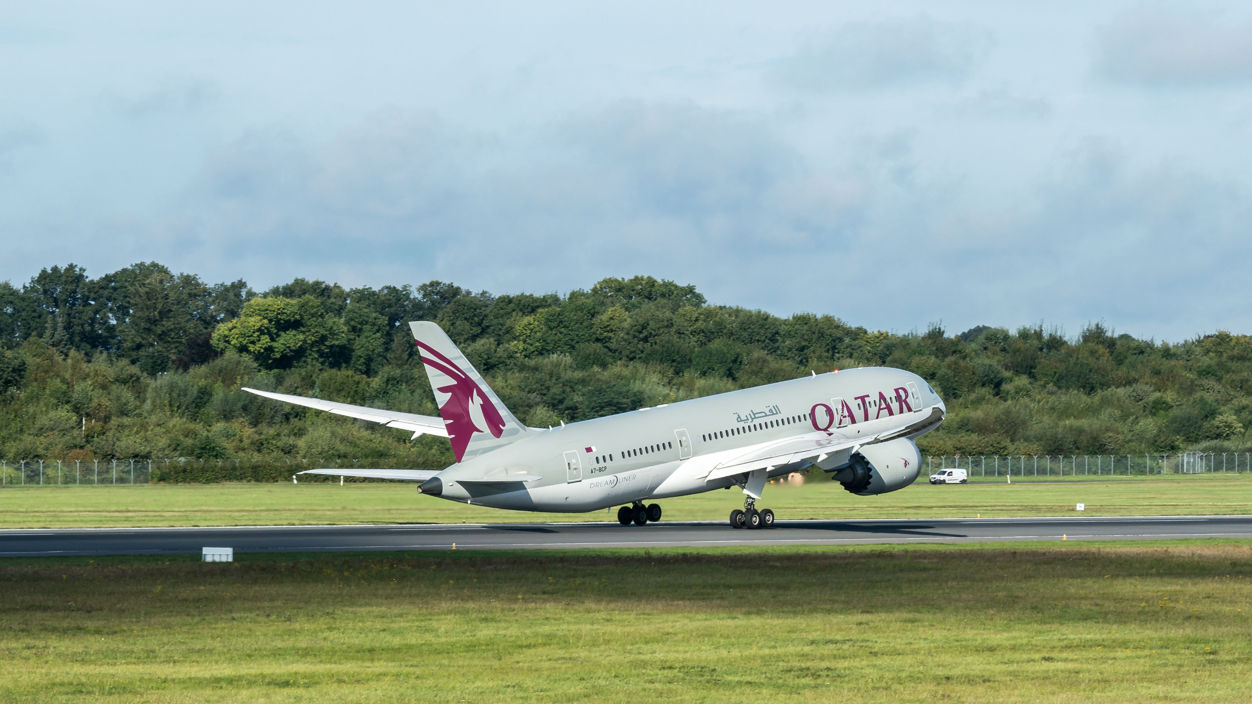 Qatar Airways Plane Taking Off at Airport · Free Stock Photo