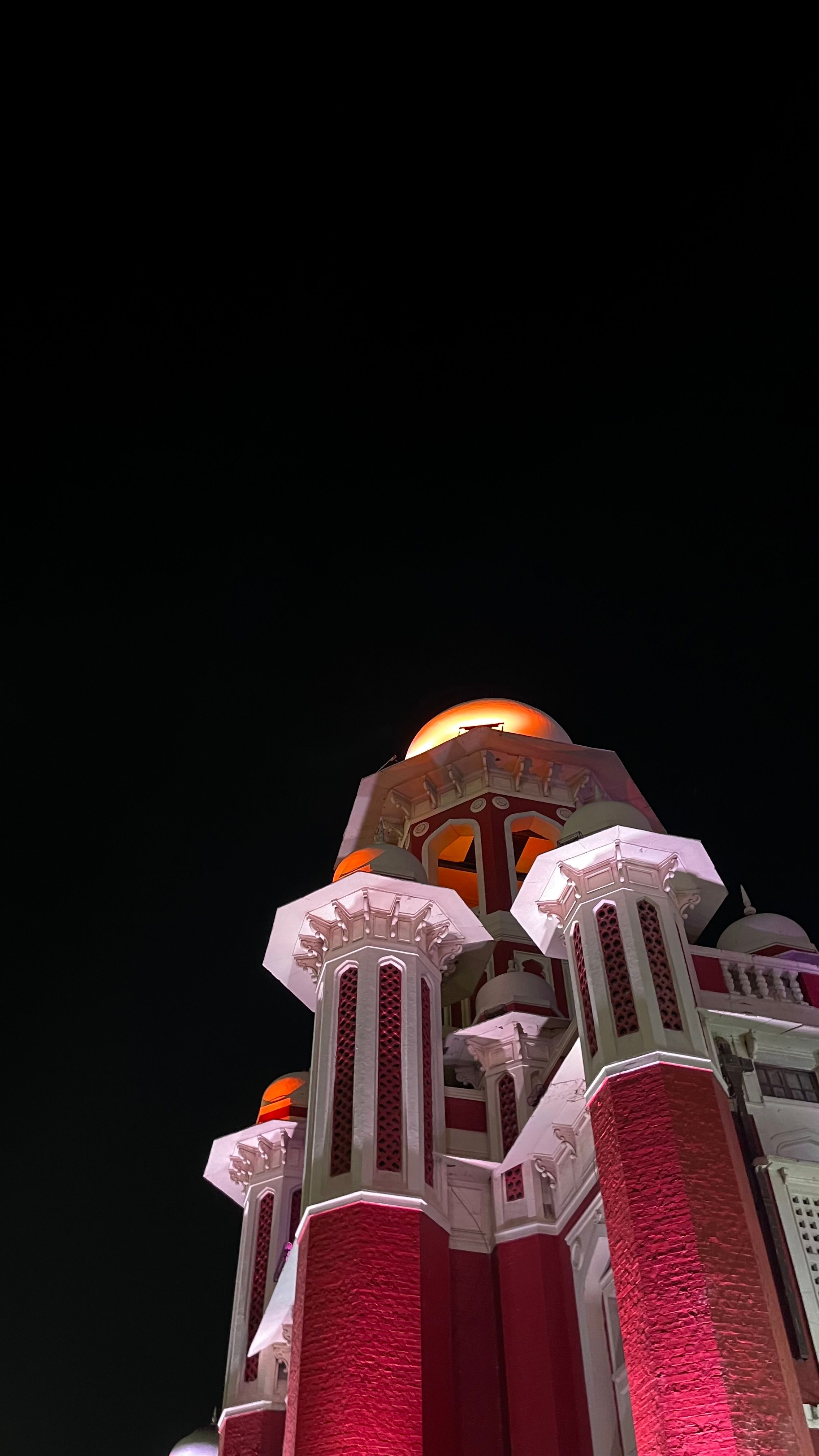 Brightly Lit Red and White Mosque at Night · Free Stock Photo