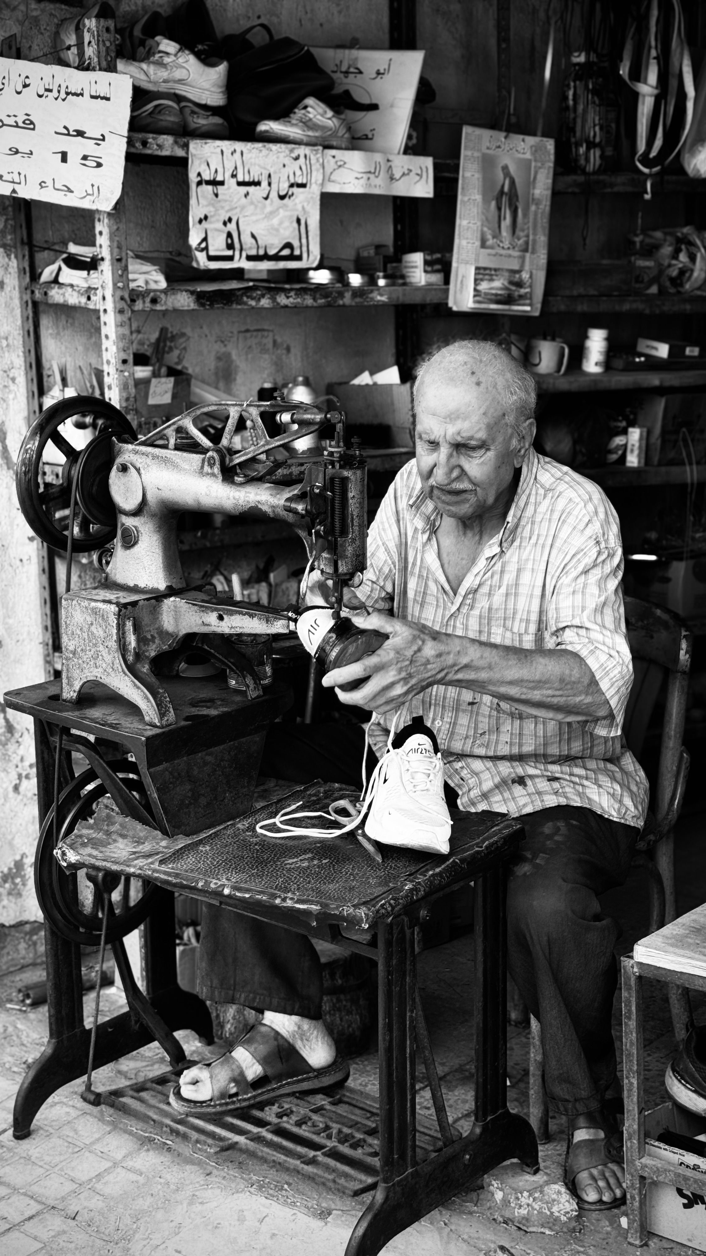 Old Shoemaker at Work in Beirut Workshop · Free Stock Photo