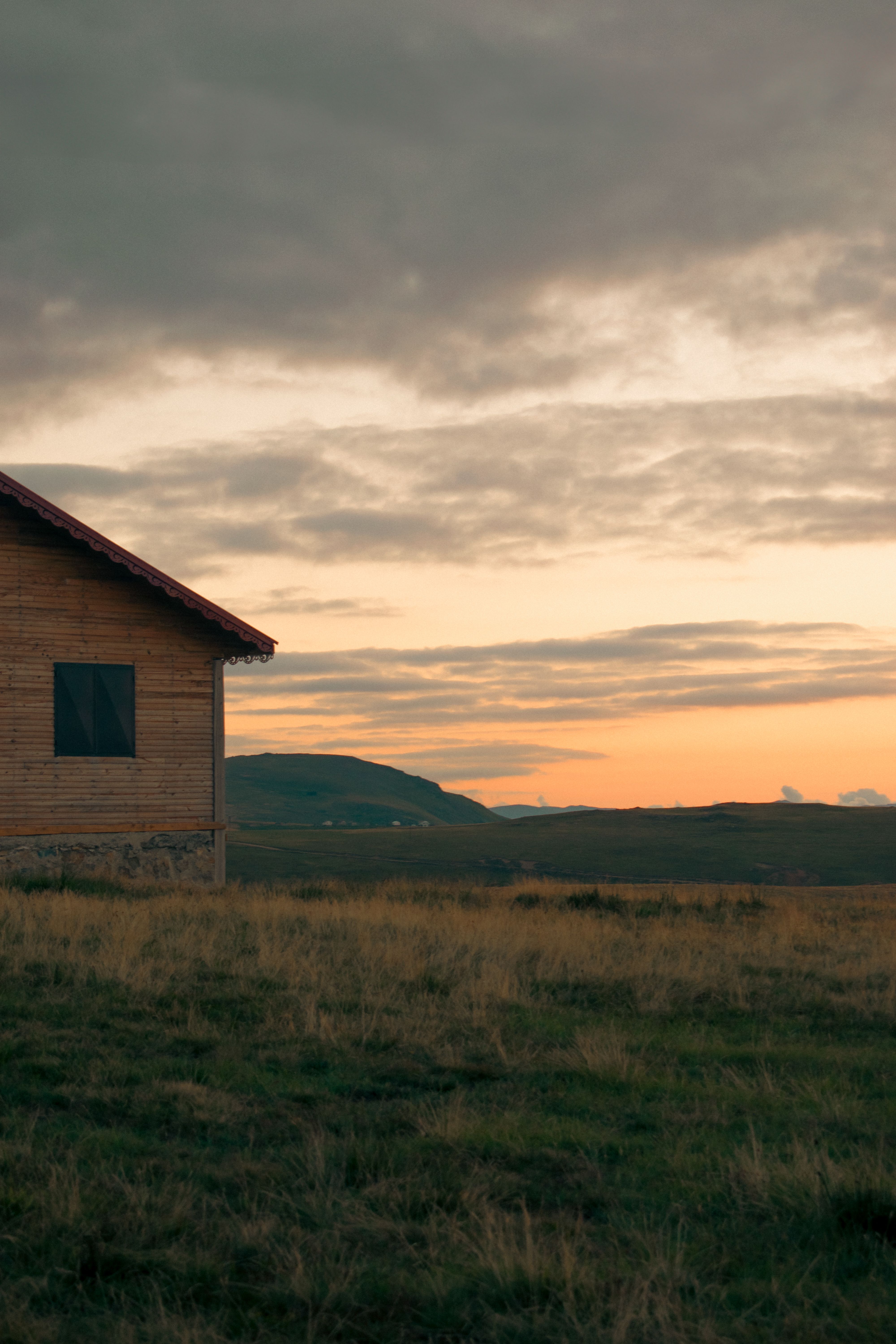Tranquil Countryside Cabin at Sunset · Free Stock Photo