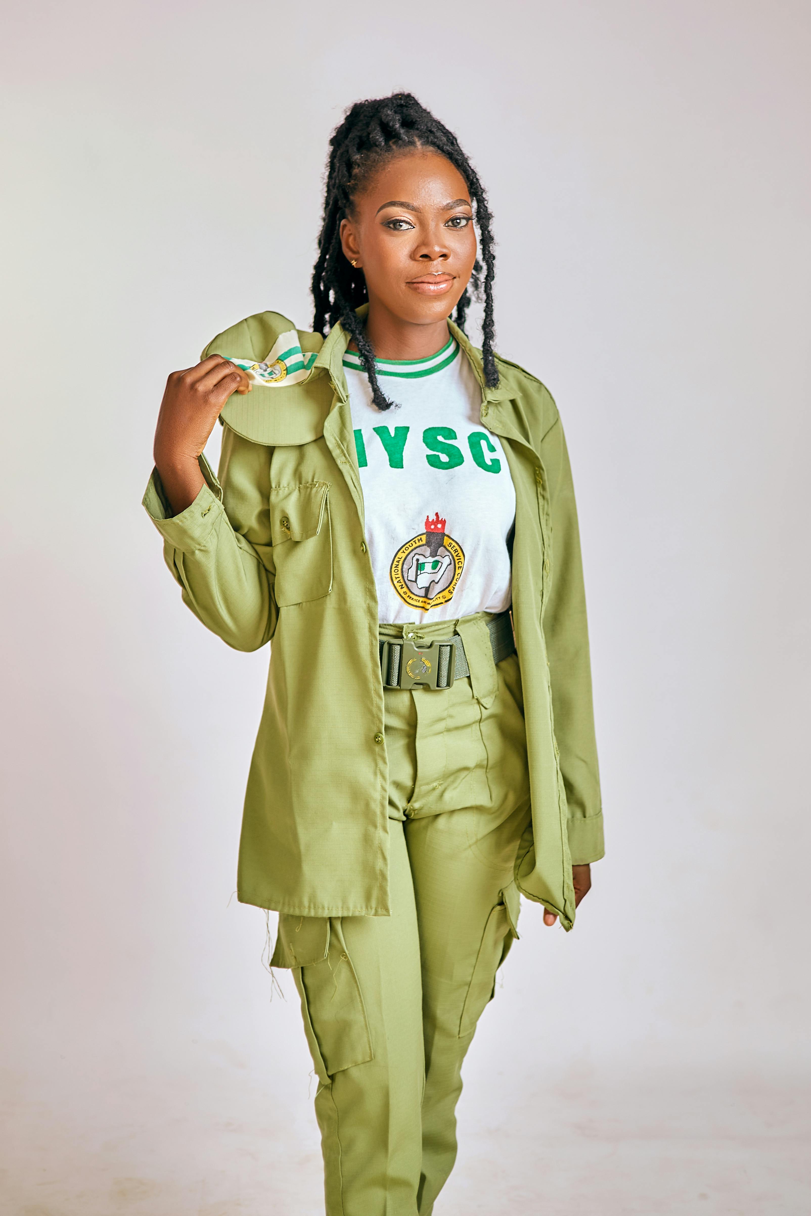 Nigerian NYSC Member in Official Uniform · Free Stock Photo