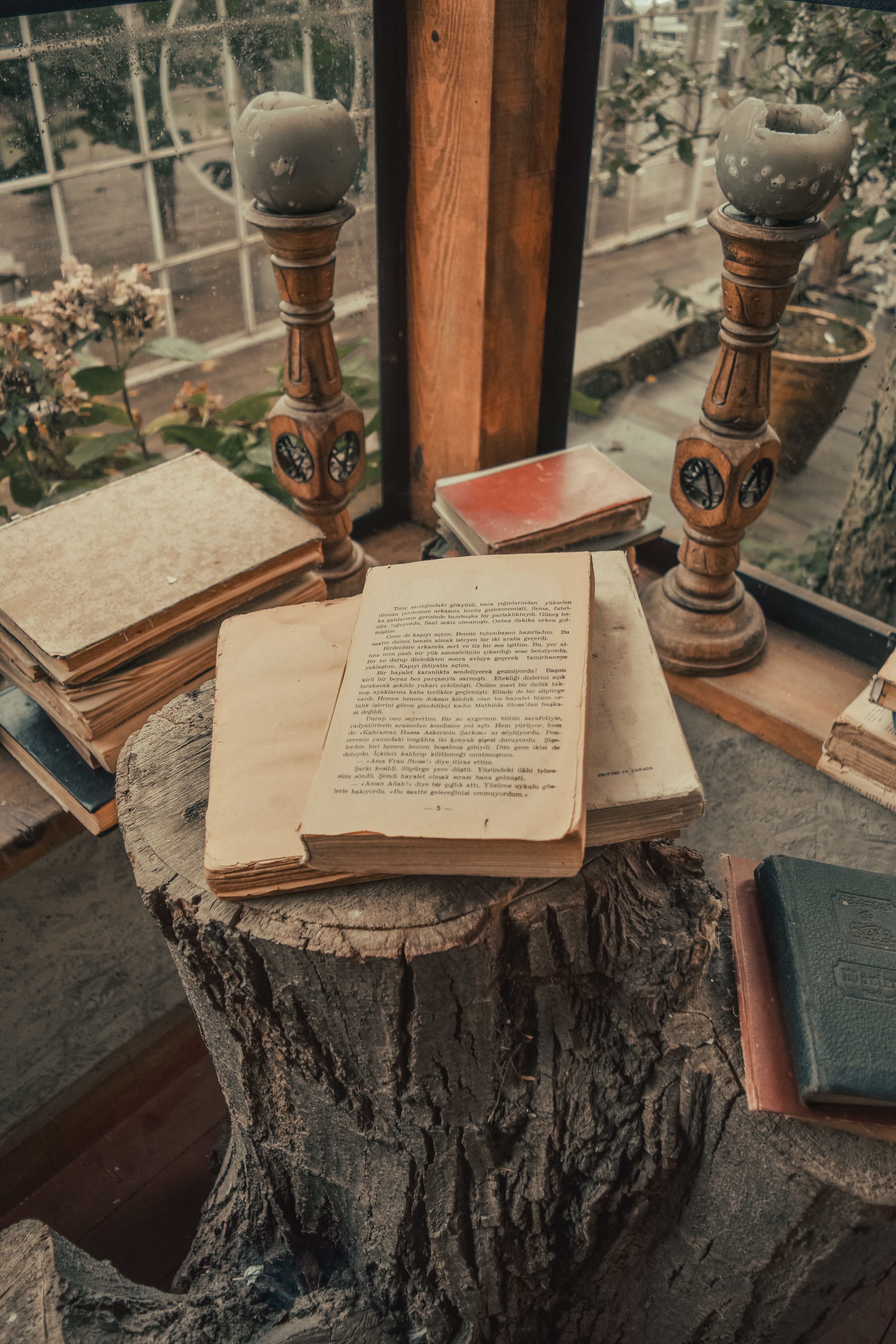 Vintage Books On Rustic Wooden Table · Free Stock Photo