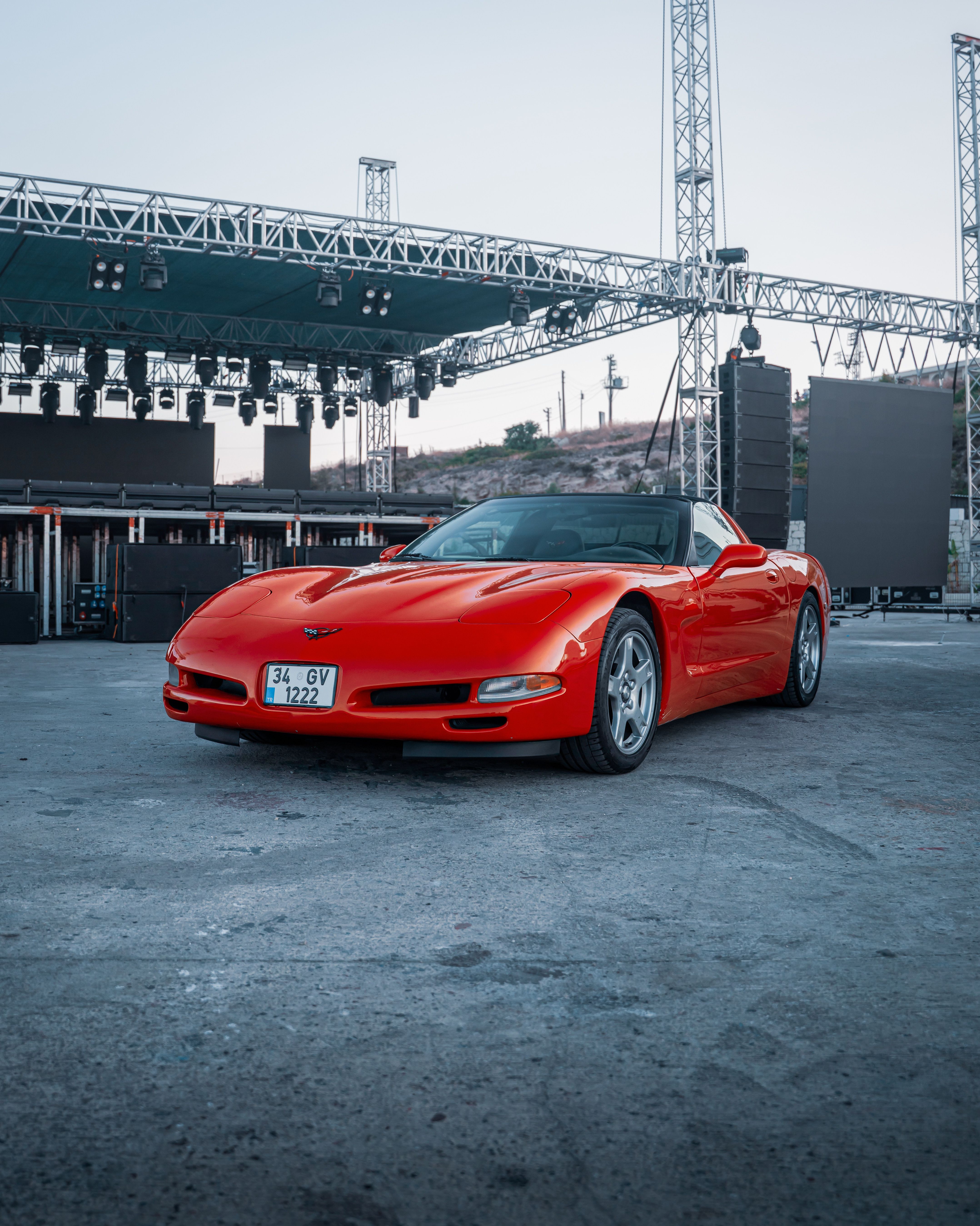 Red Sports Car at Outdoor Event Stage in İzmir · Free Stock Photo