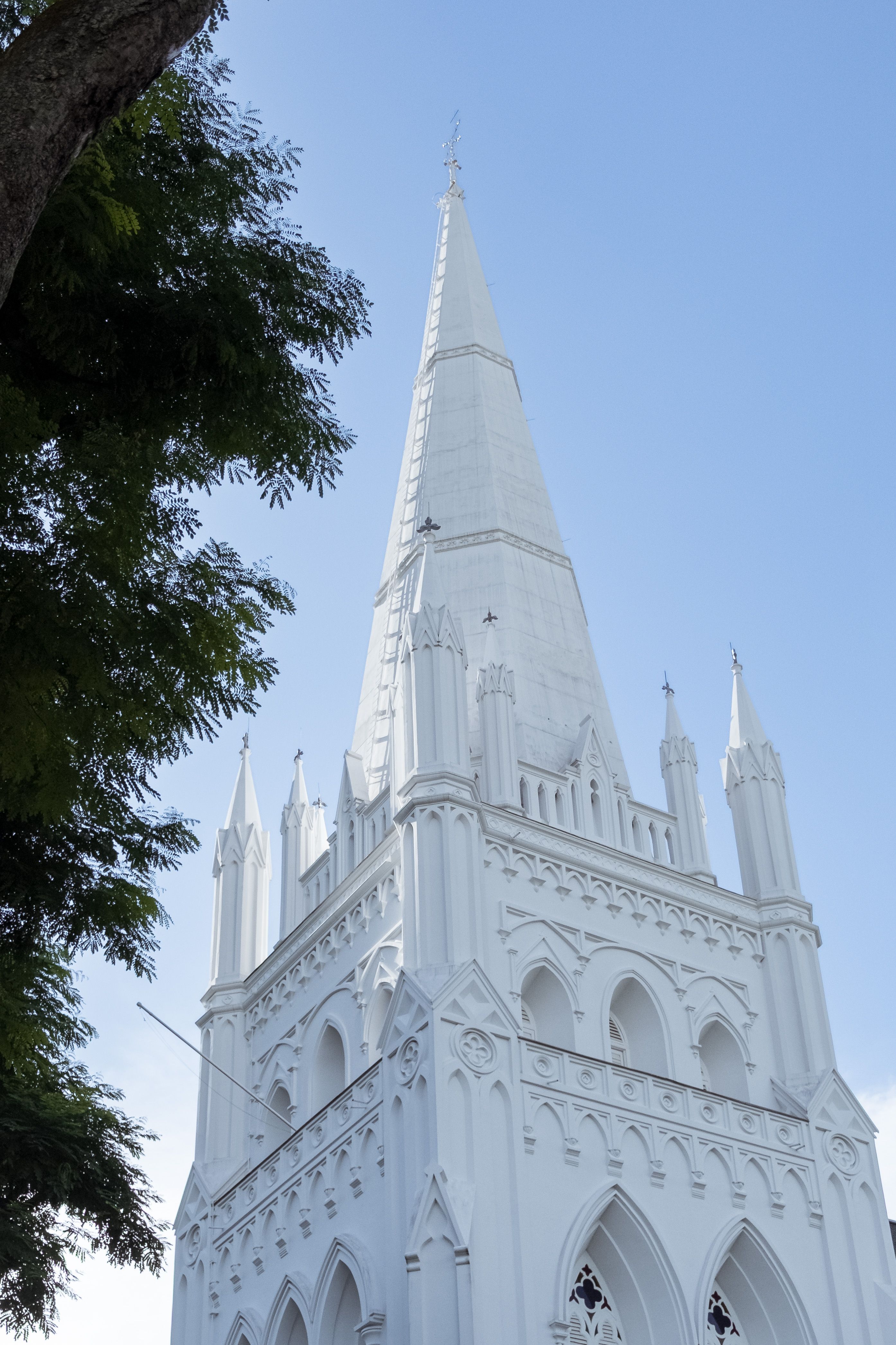 Stunning View of Gothic Church Spire with Clear Sky · Free Stock Photo