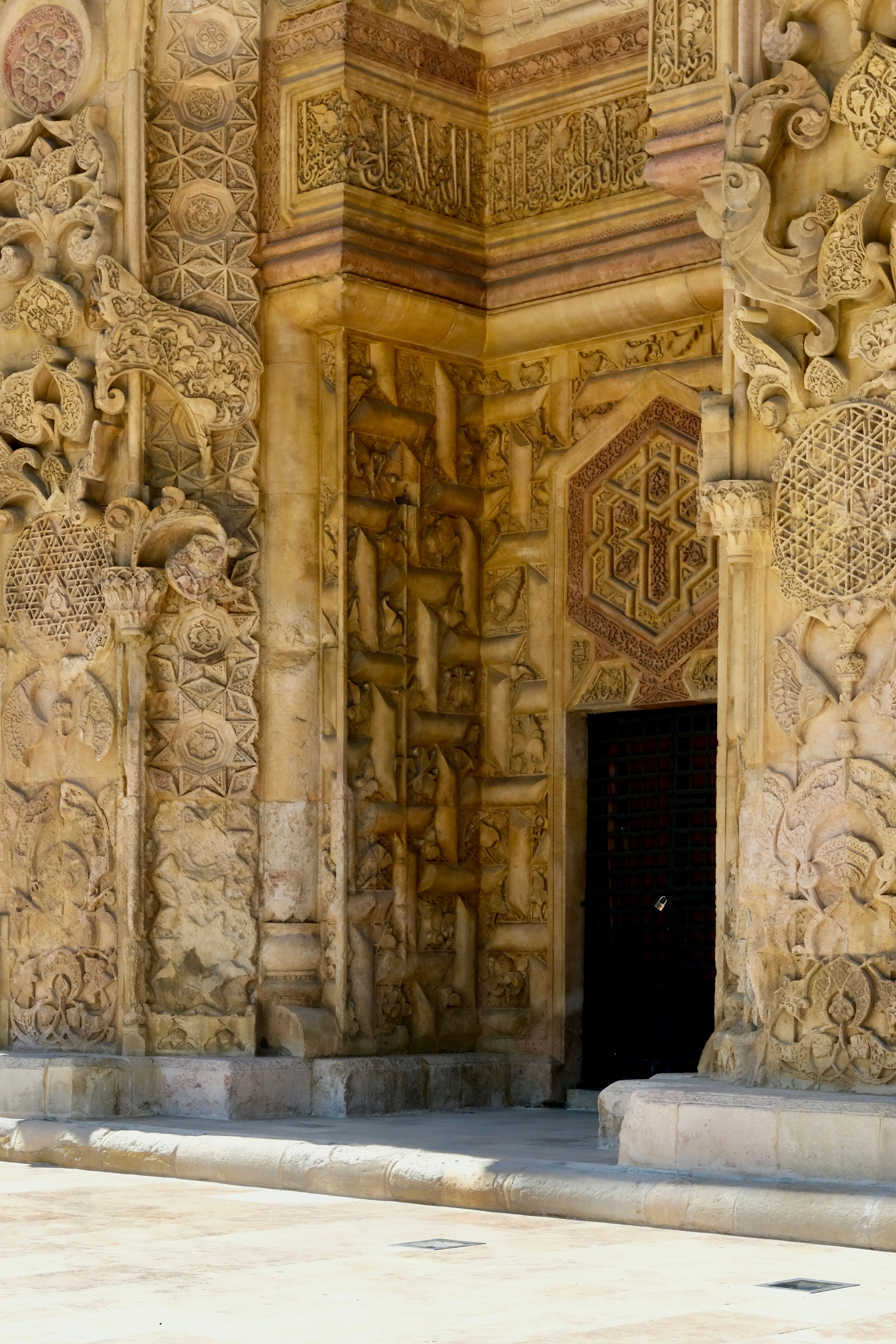 Intricately Carved Stone Facade of Ancient Building · Free Stock Photo