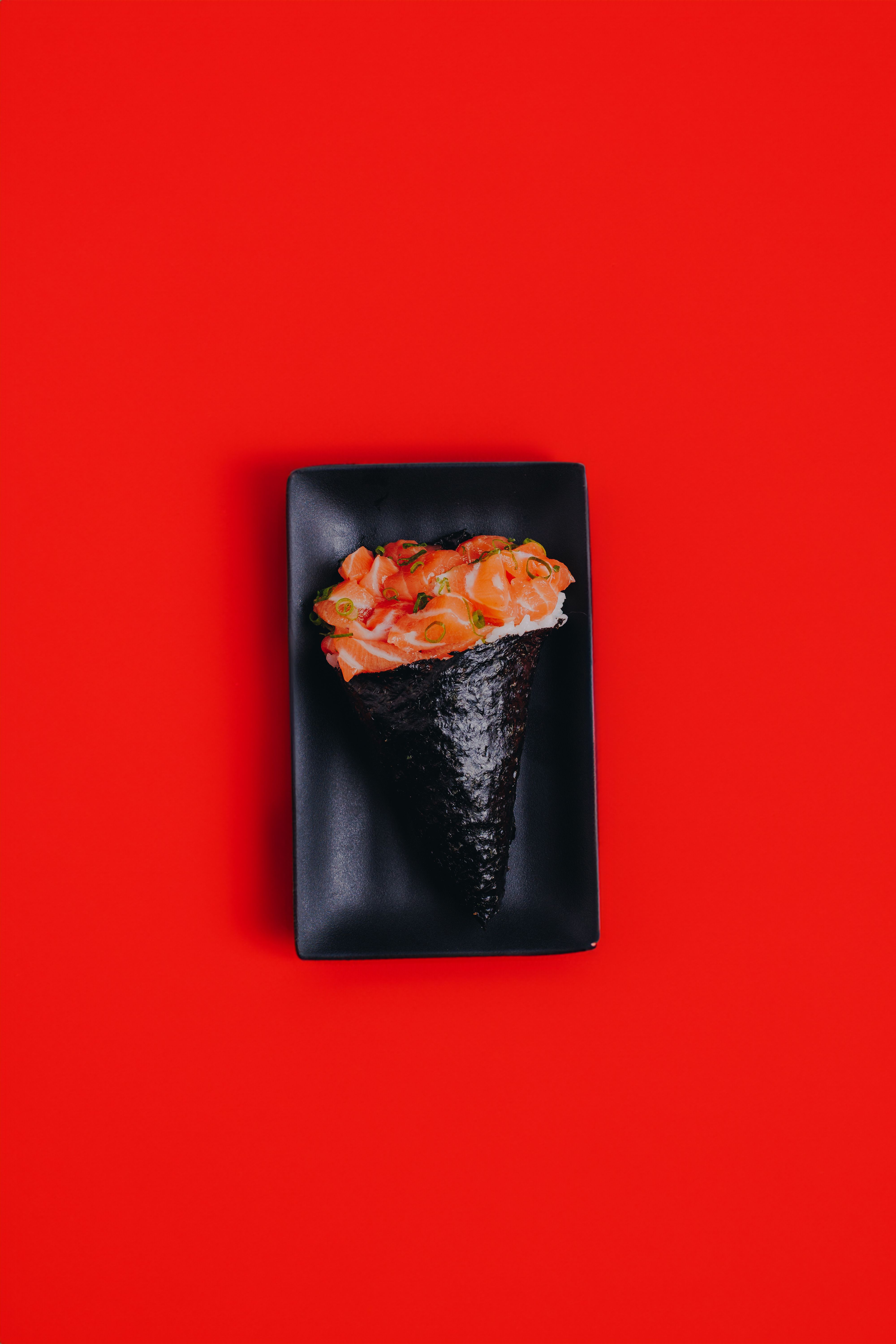 Delicious Salmon Hand Roll on Black Plate · Free Stock Photo