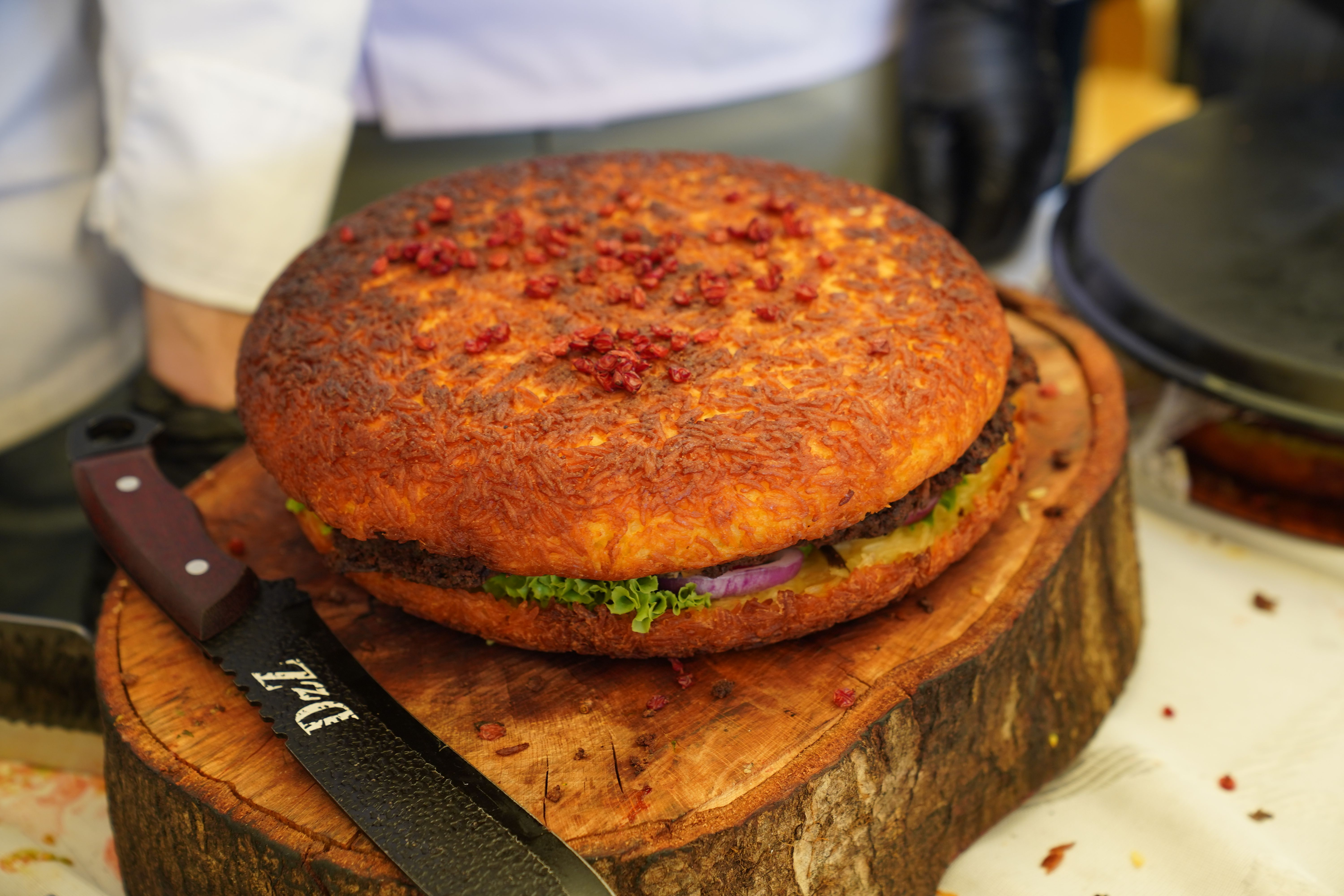 Giant Burger on Wooden Serving Board · Free Stock Photo