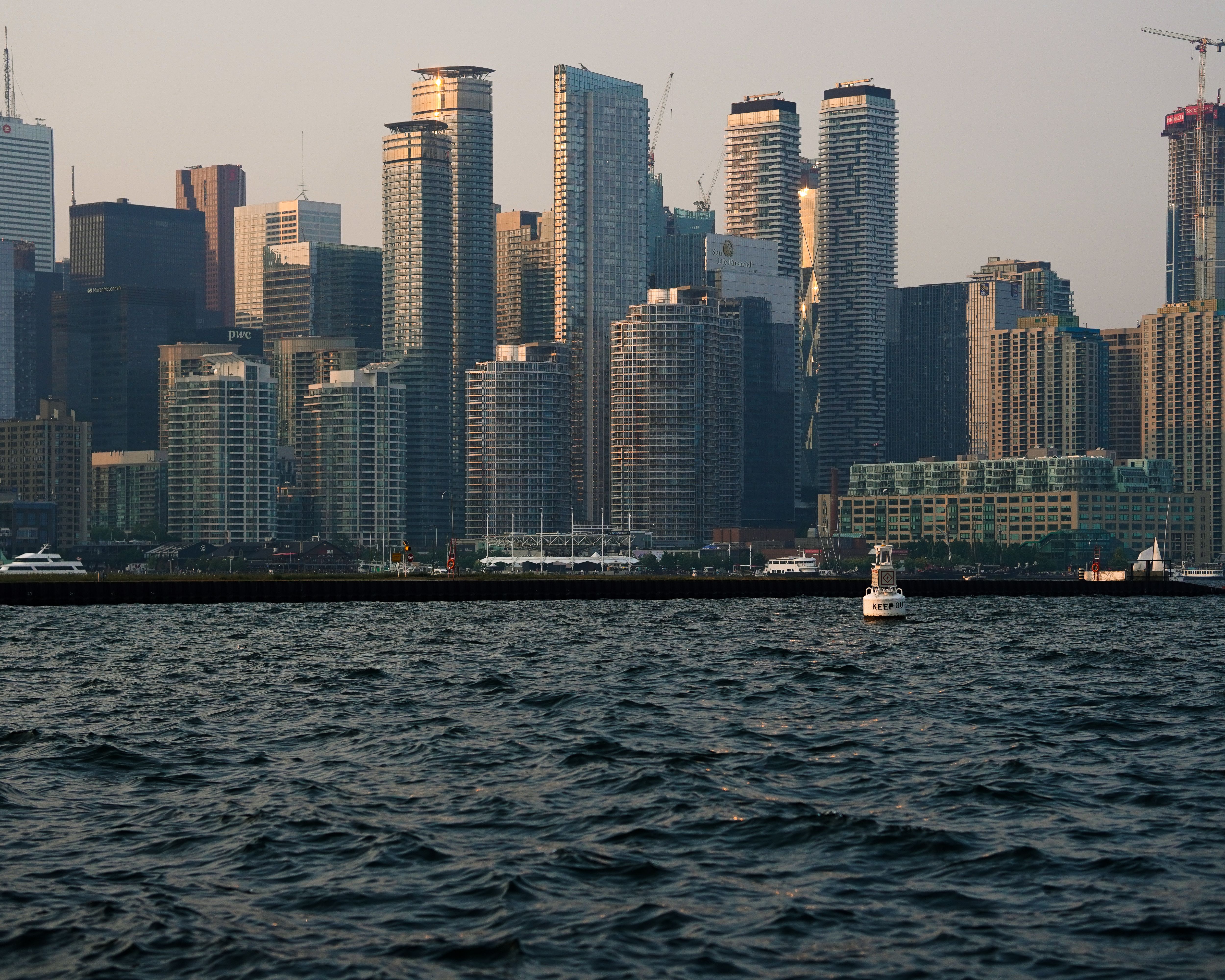 Toronto Skyline Overlooking Lake Ontario at Dusk · Free Stock Photo