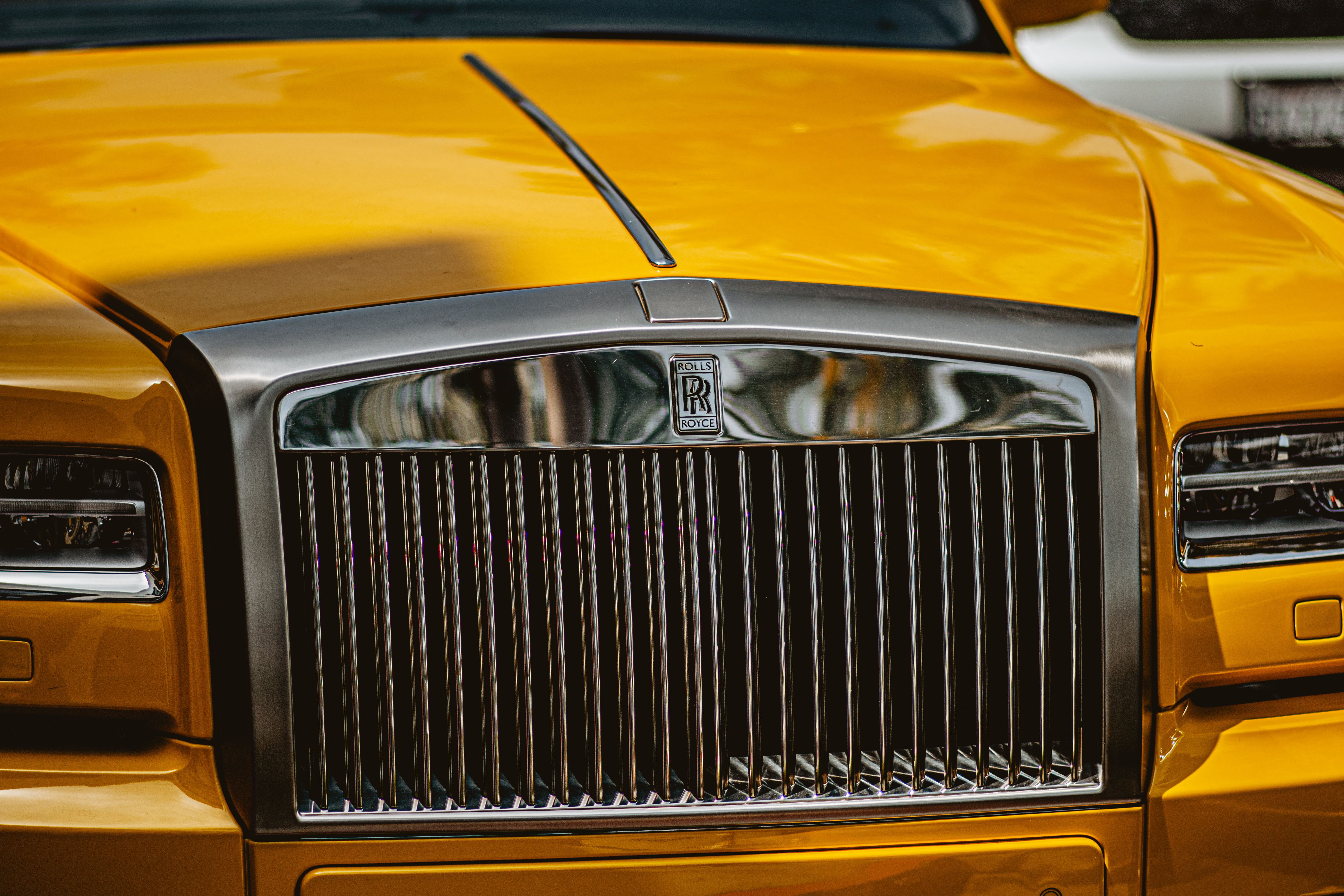 Luxury Yellow Car Front Grille Close-Up · Free Stock Photo