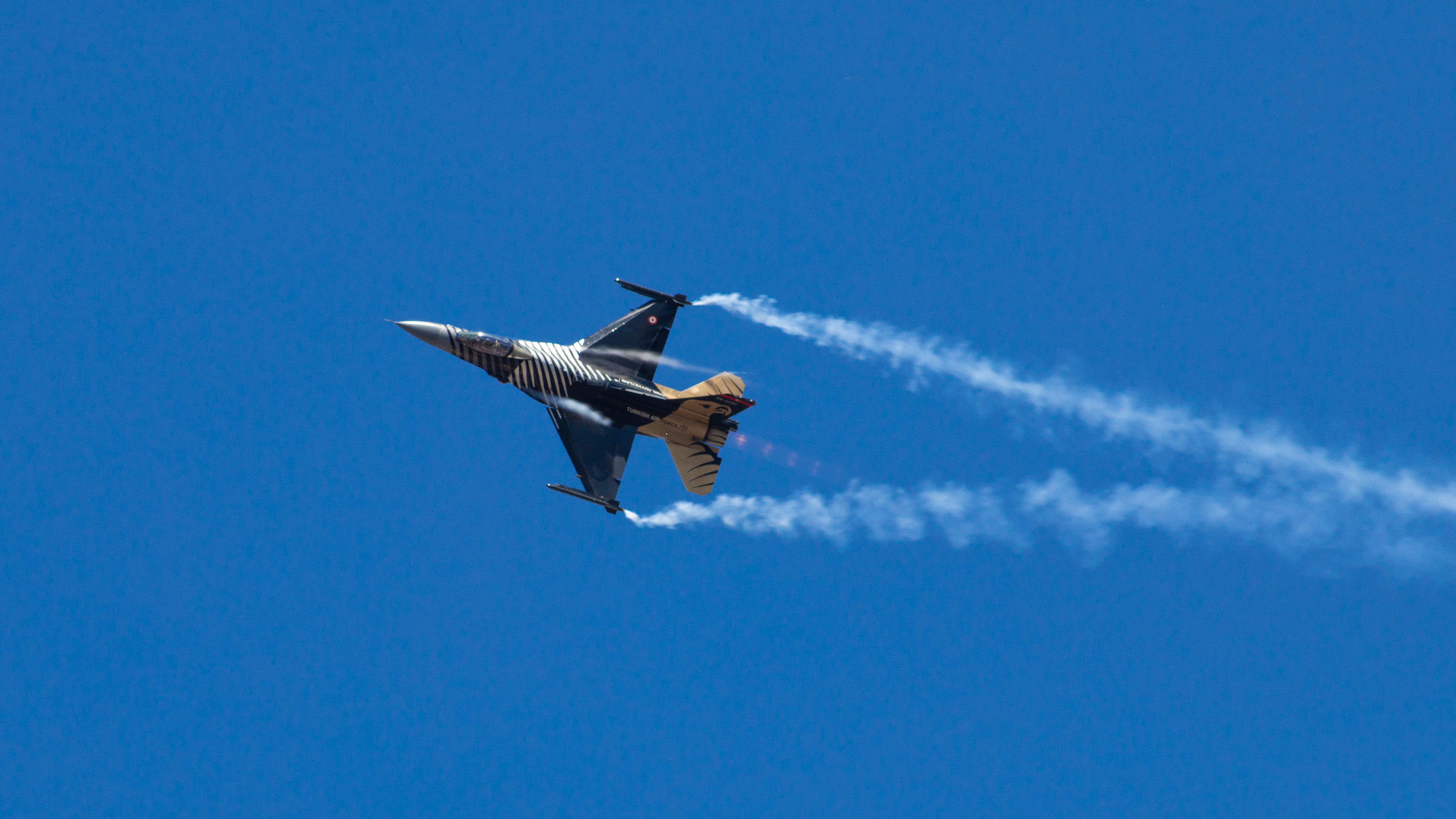 Fighter Jet Performing Aerial Maneuver at Dusk · Free Stock Photo