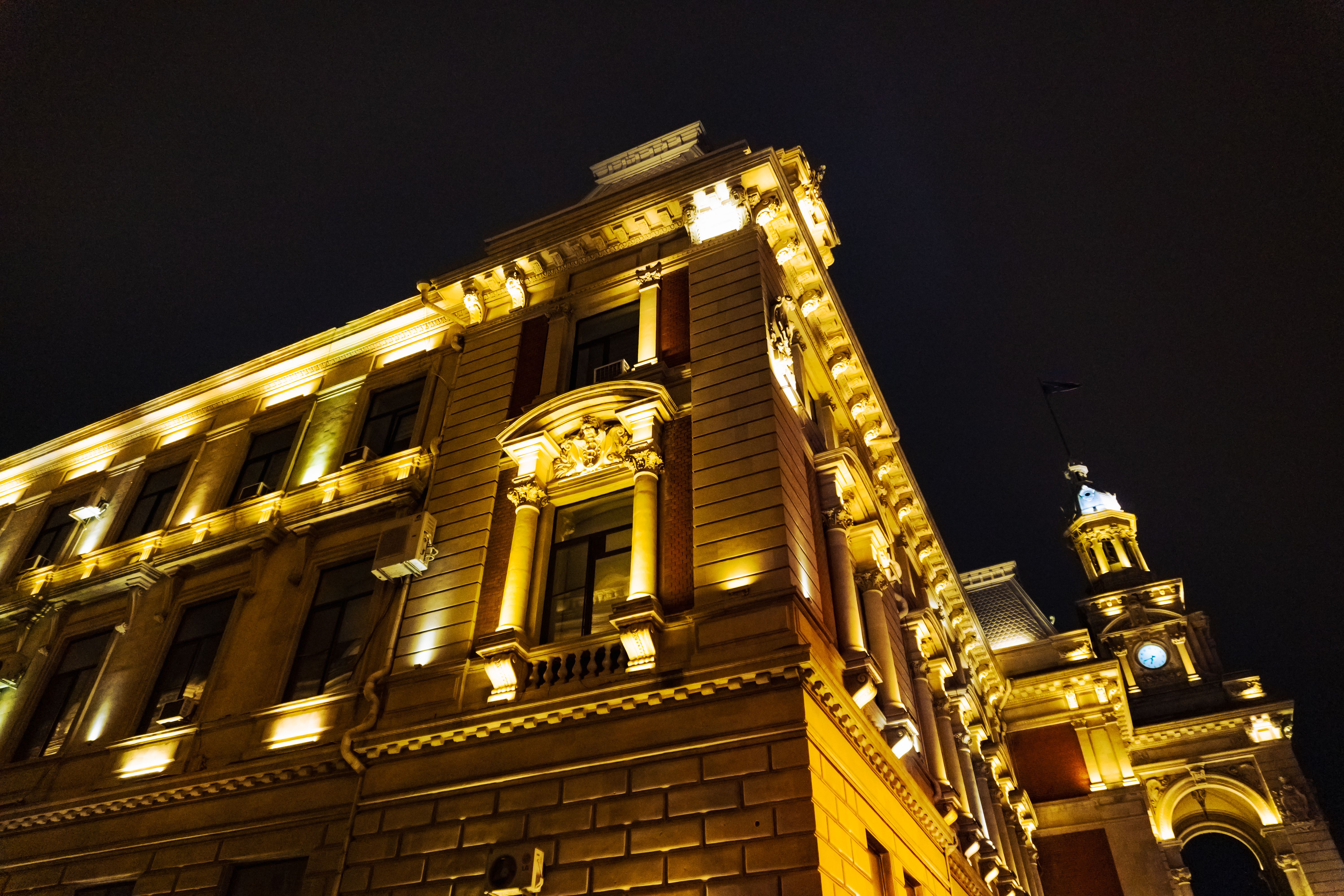 Illuminated Historic Building at Night · Free Stock Photo