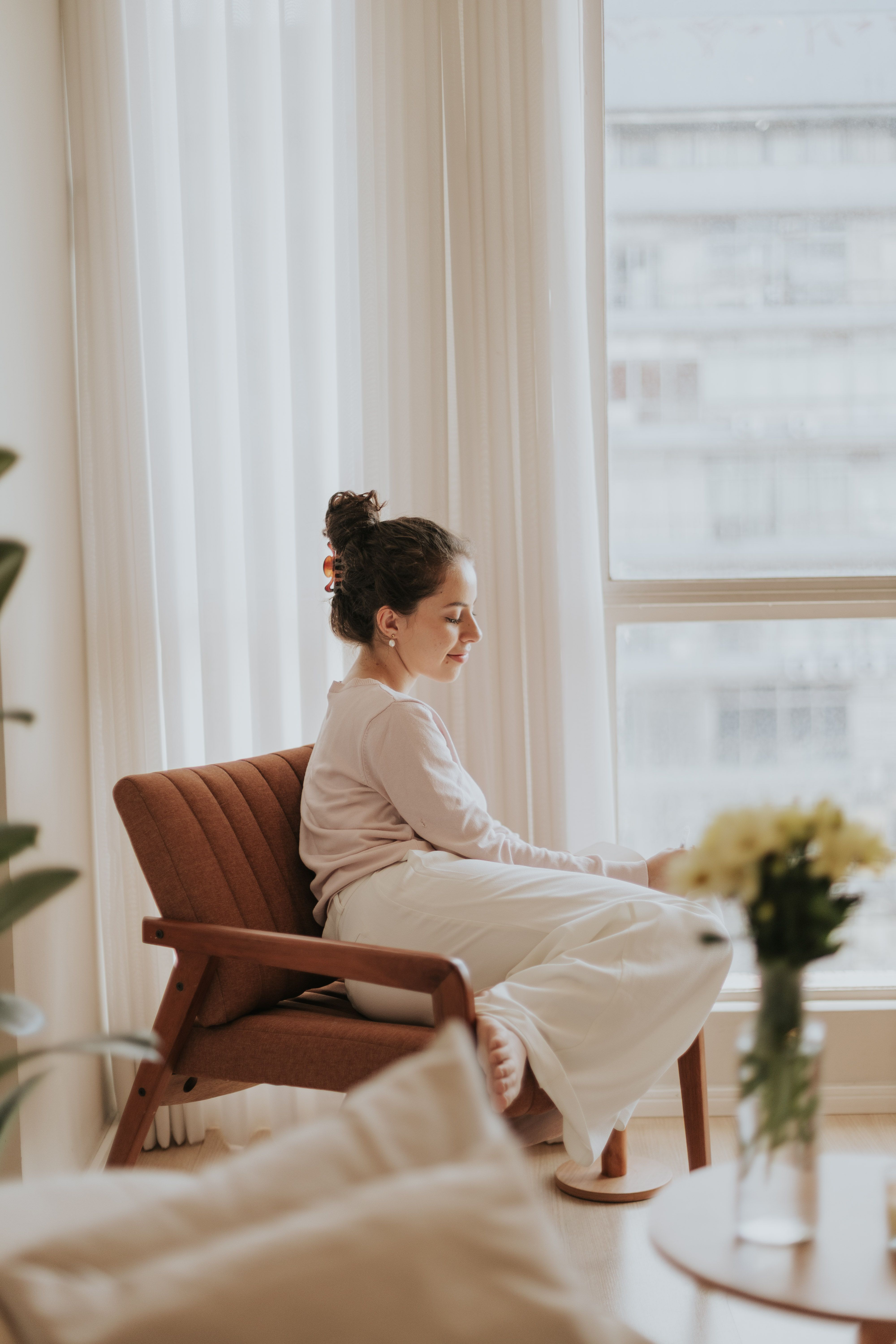 Relaxed Journaling by the Window in Natural Light · Free Stock Photo