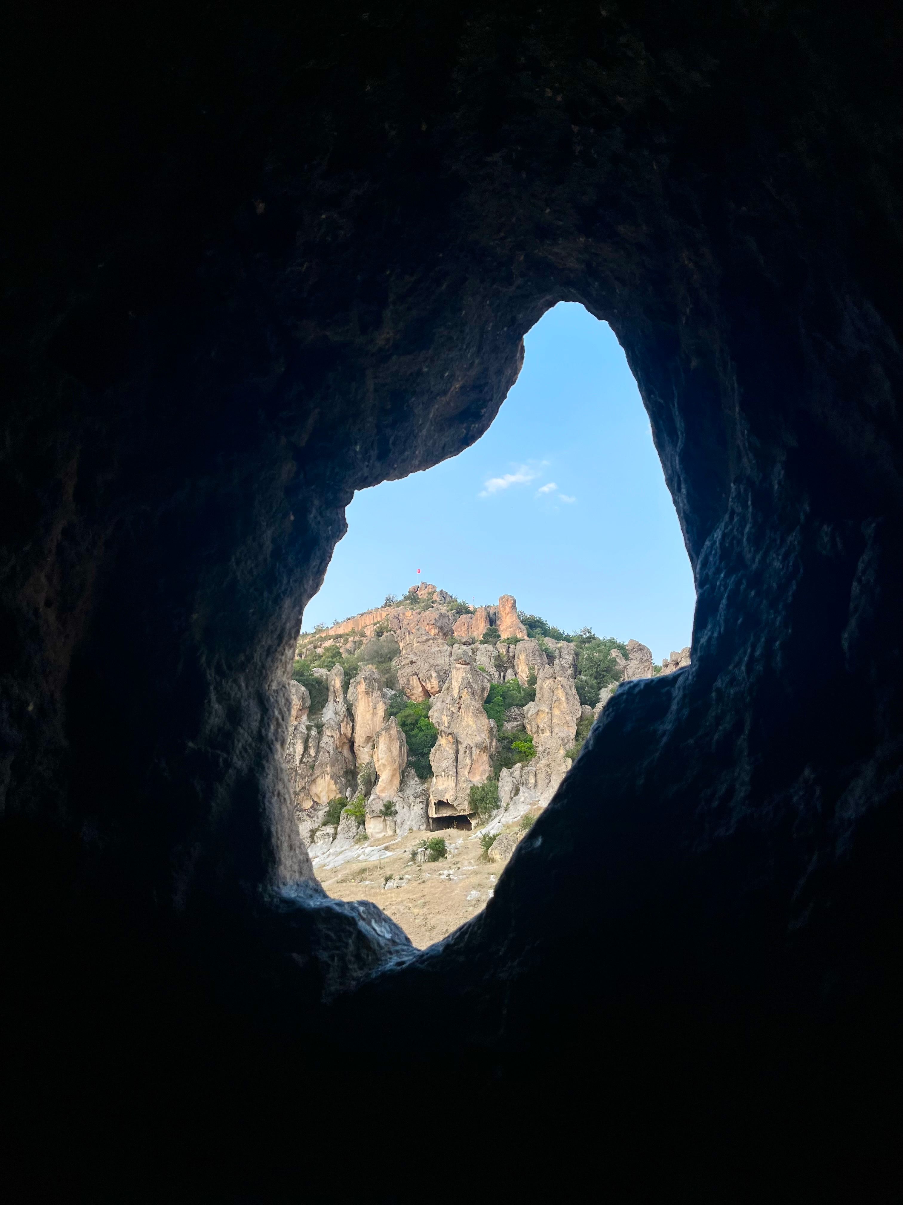 Rocky Landscape View Through a Cave Opening · Free Stock Photo