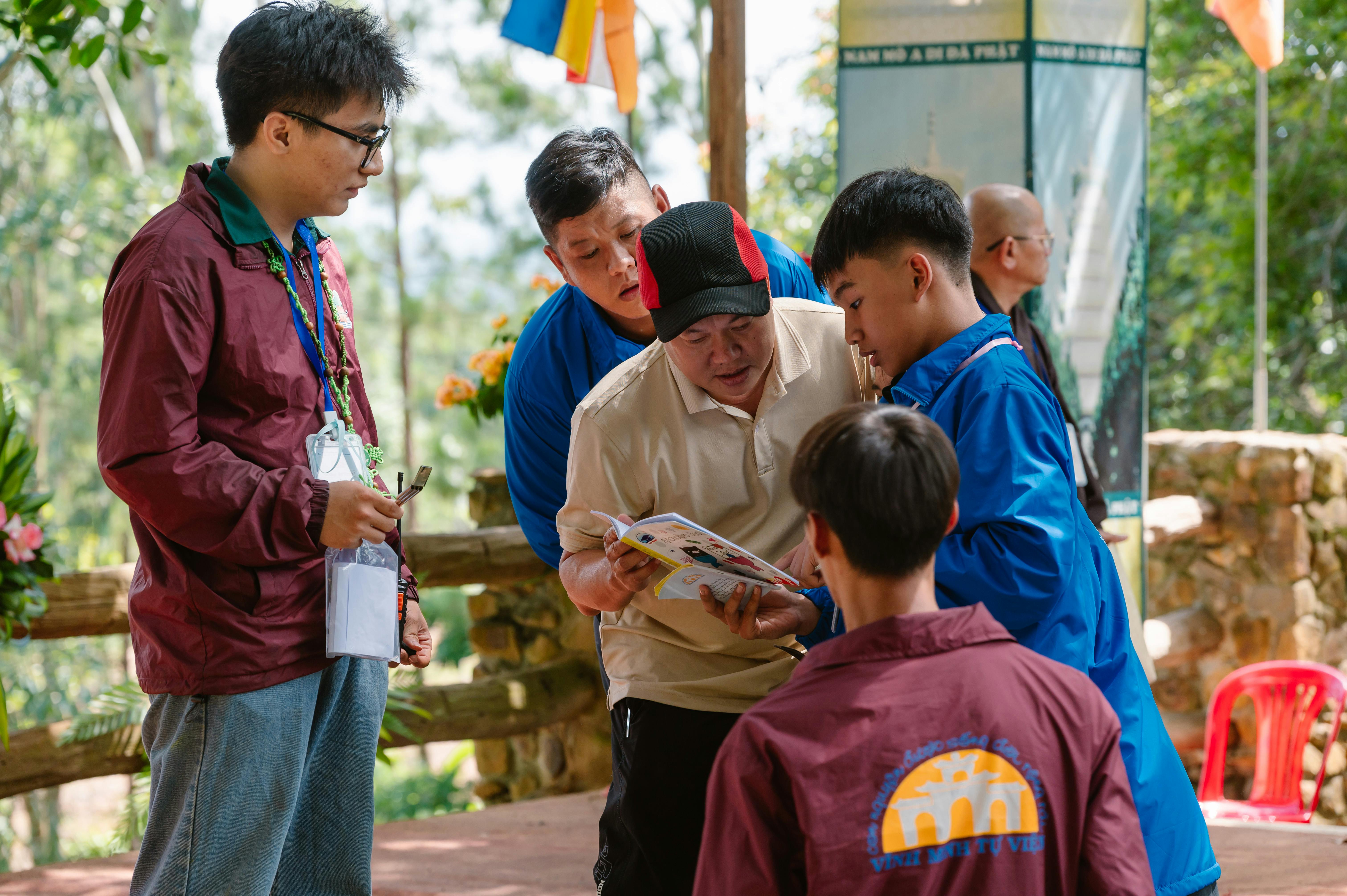 Group of People Engaging in Outdoor Discussion · Free Stock Photo