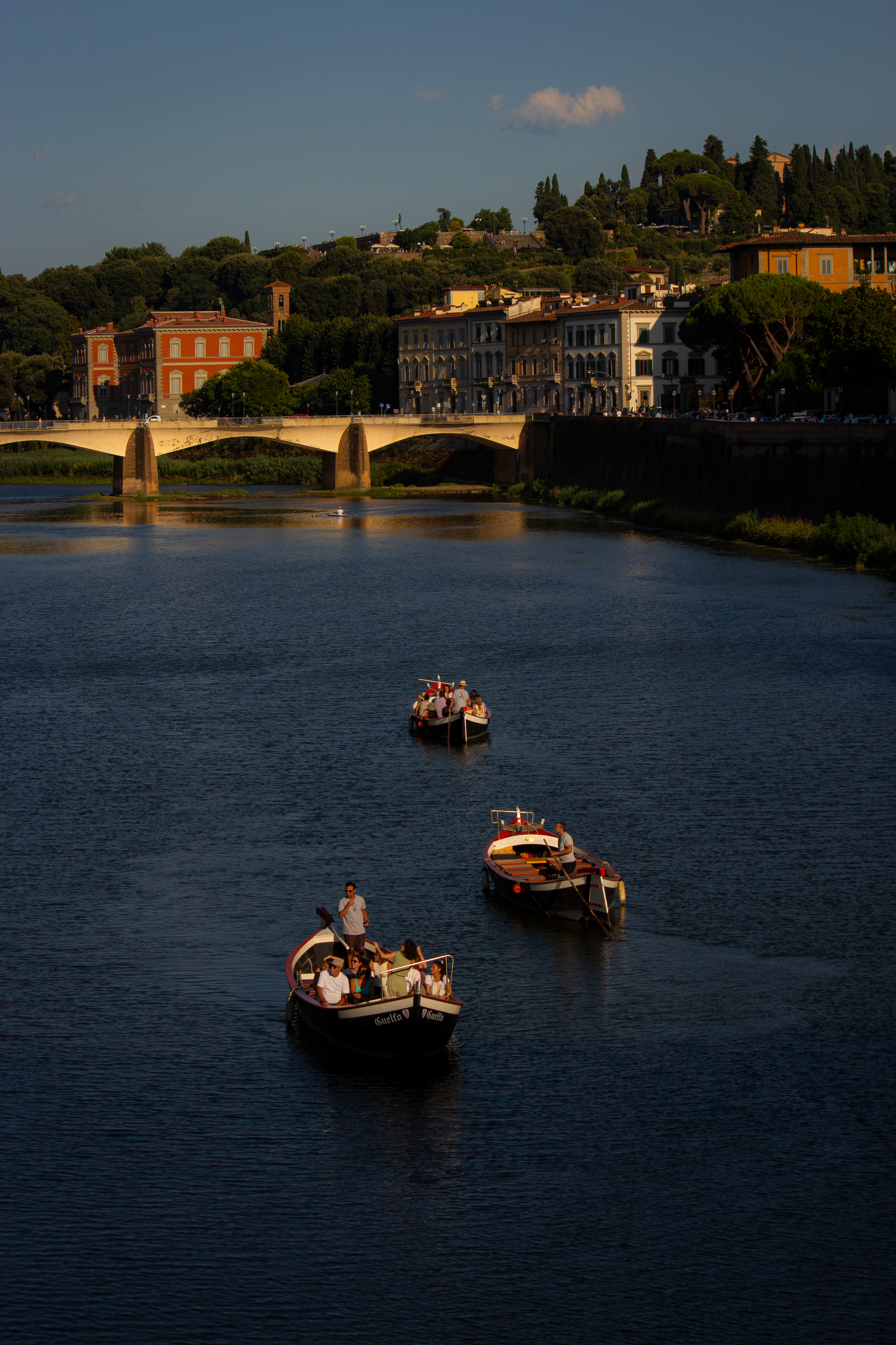 Boats on the Arno River in Florence, Italy · Free Stock Photo