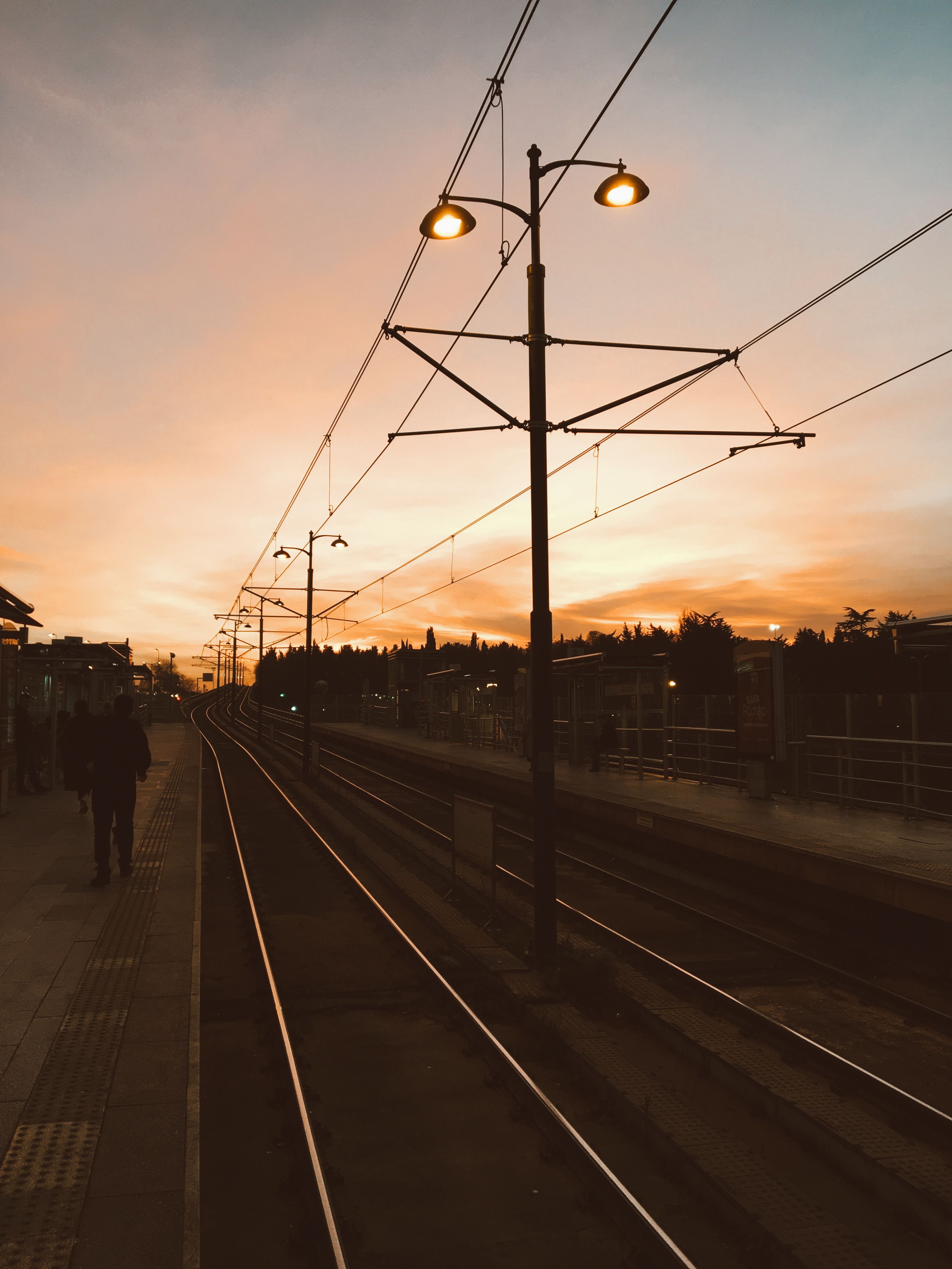 Landscape View of Railway Station during Sunrise · Free Stock Photo