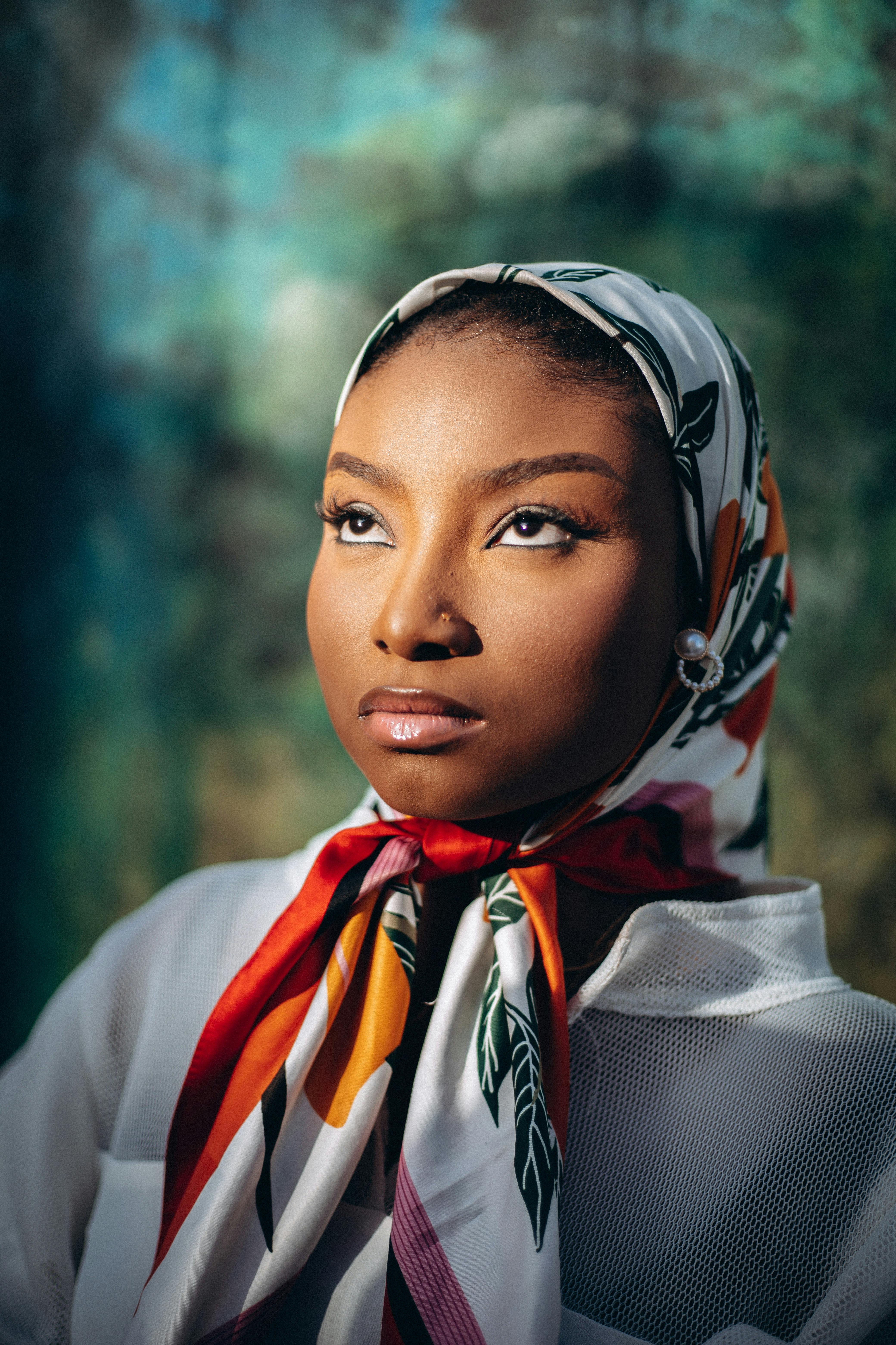 Elegant Portrait of Woman in Colorful Headscarf · Free Stock Photo