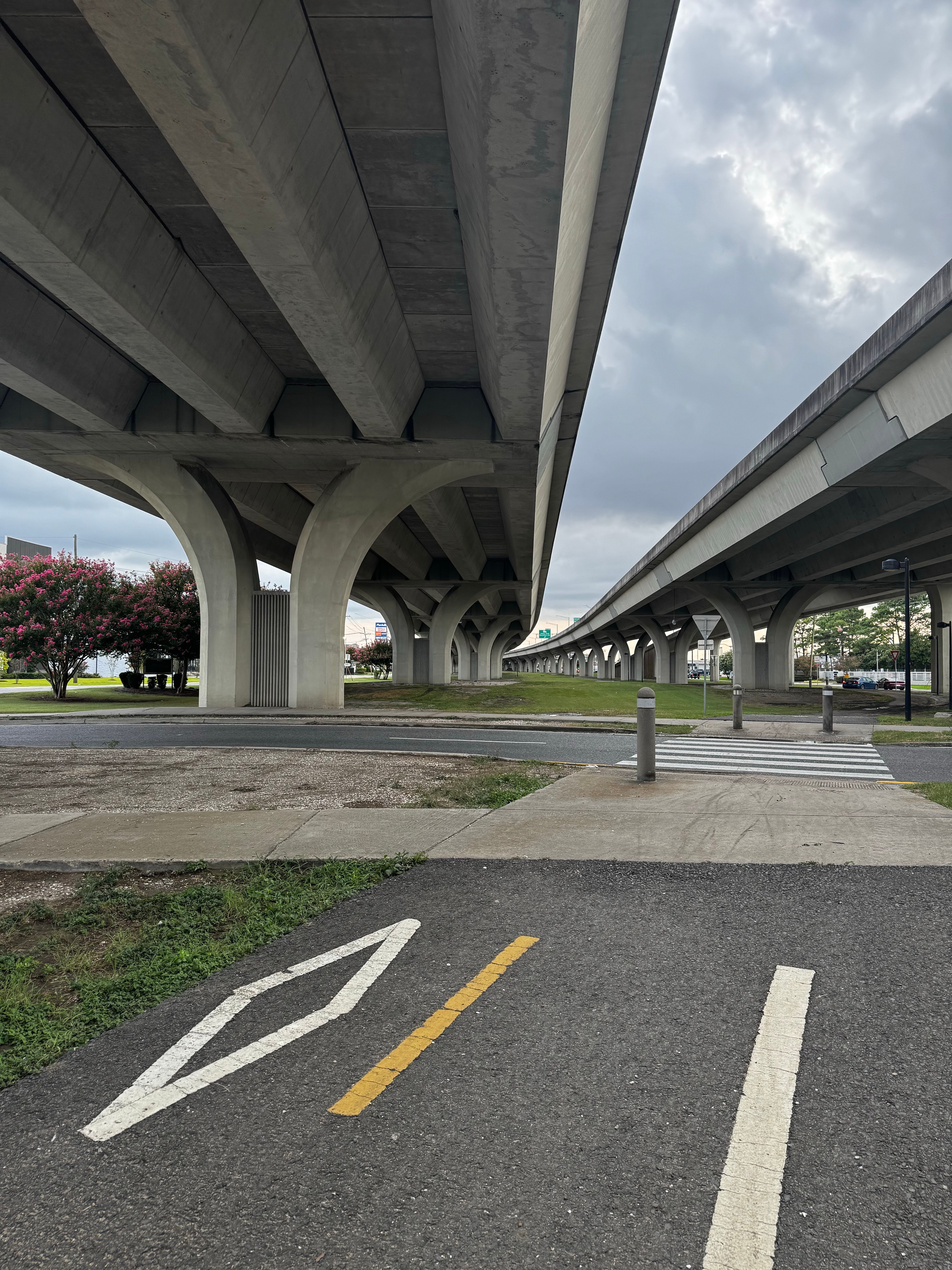 Underpass View with Dramatic Sky and Road Markings · Free Stock Photo
