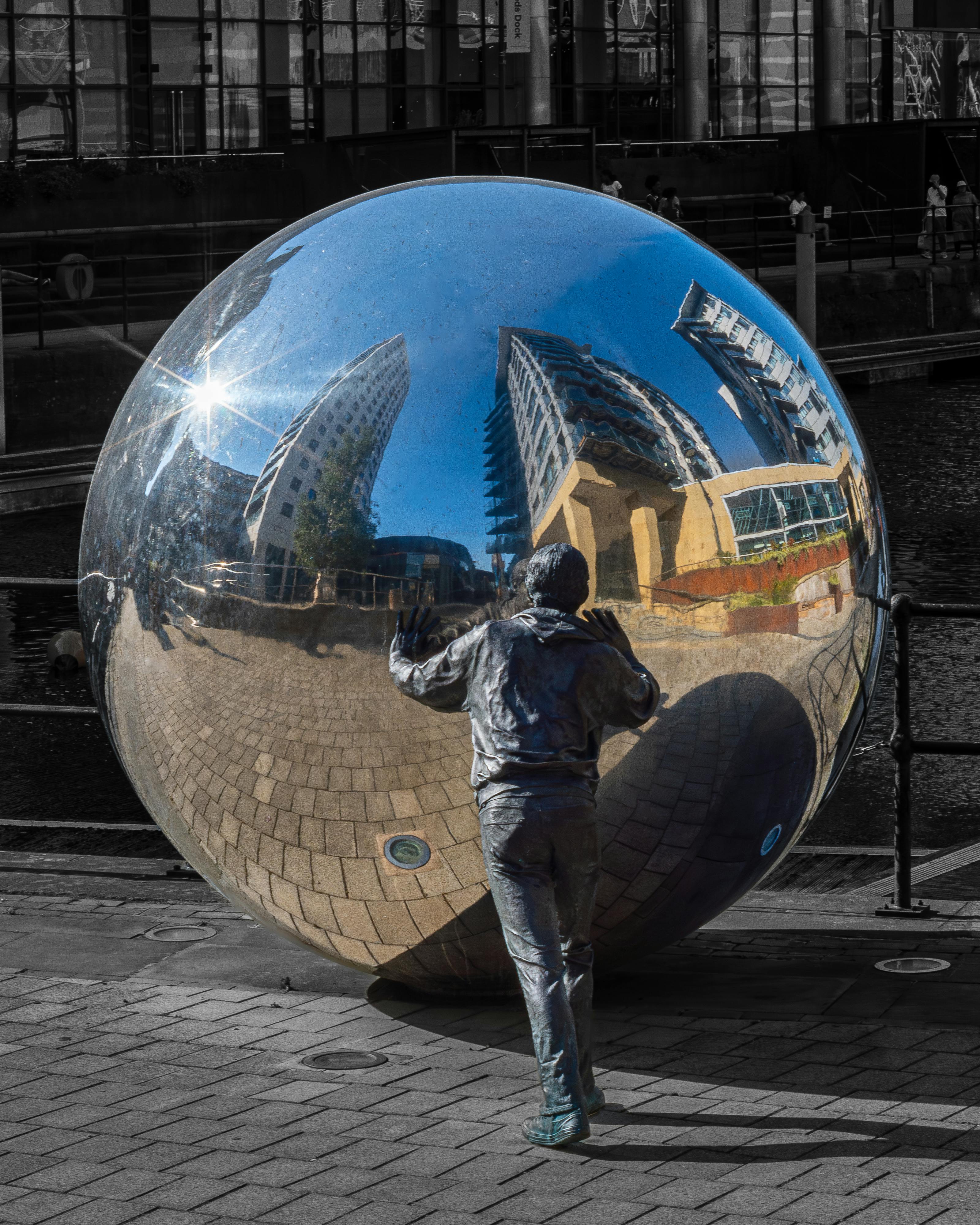 Sculpture Reflection in Modern Urban Setting · Free Stock Photo