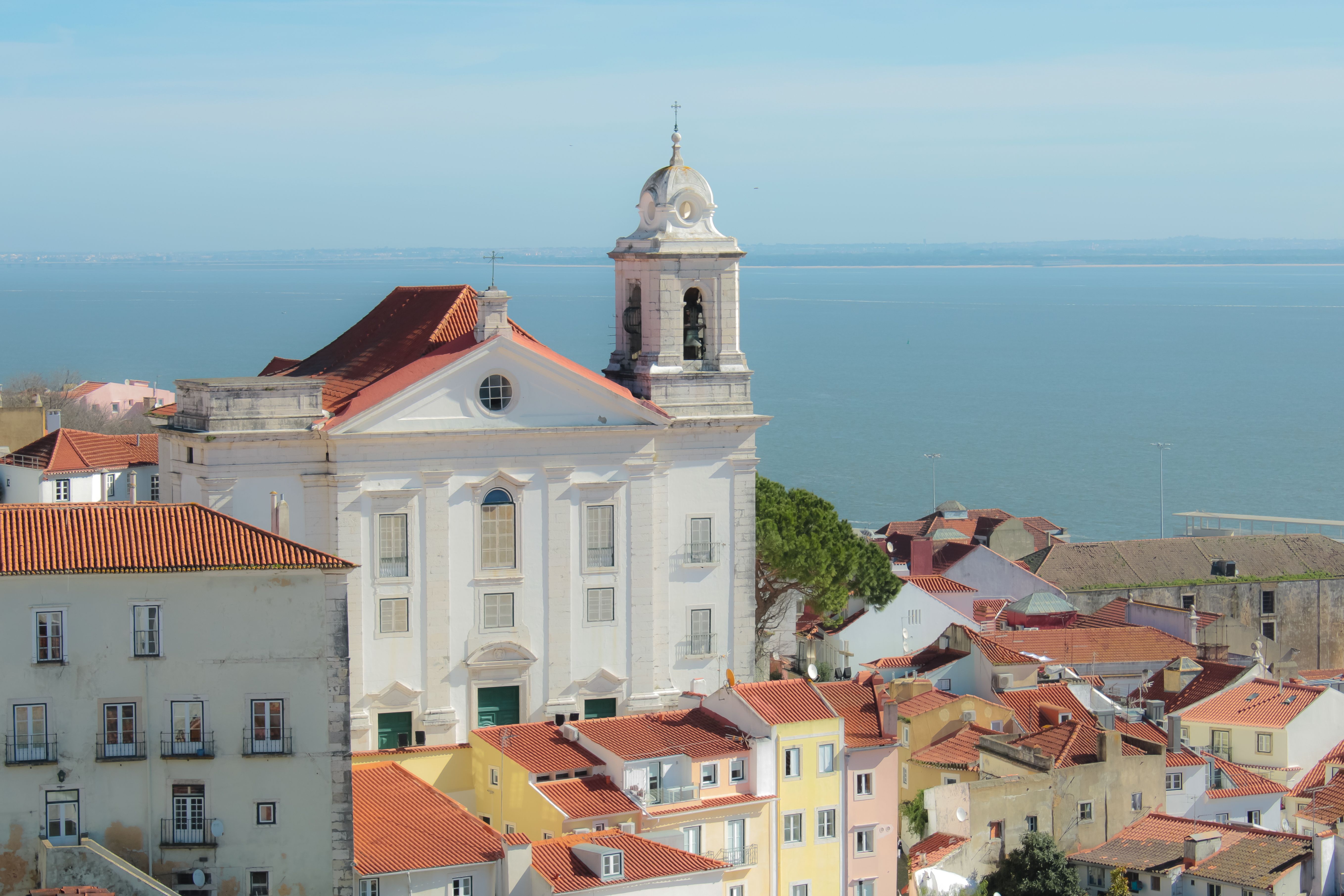 Scenic View of Lisbon's Alfama District and Tagus River · Free Stock Photo