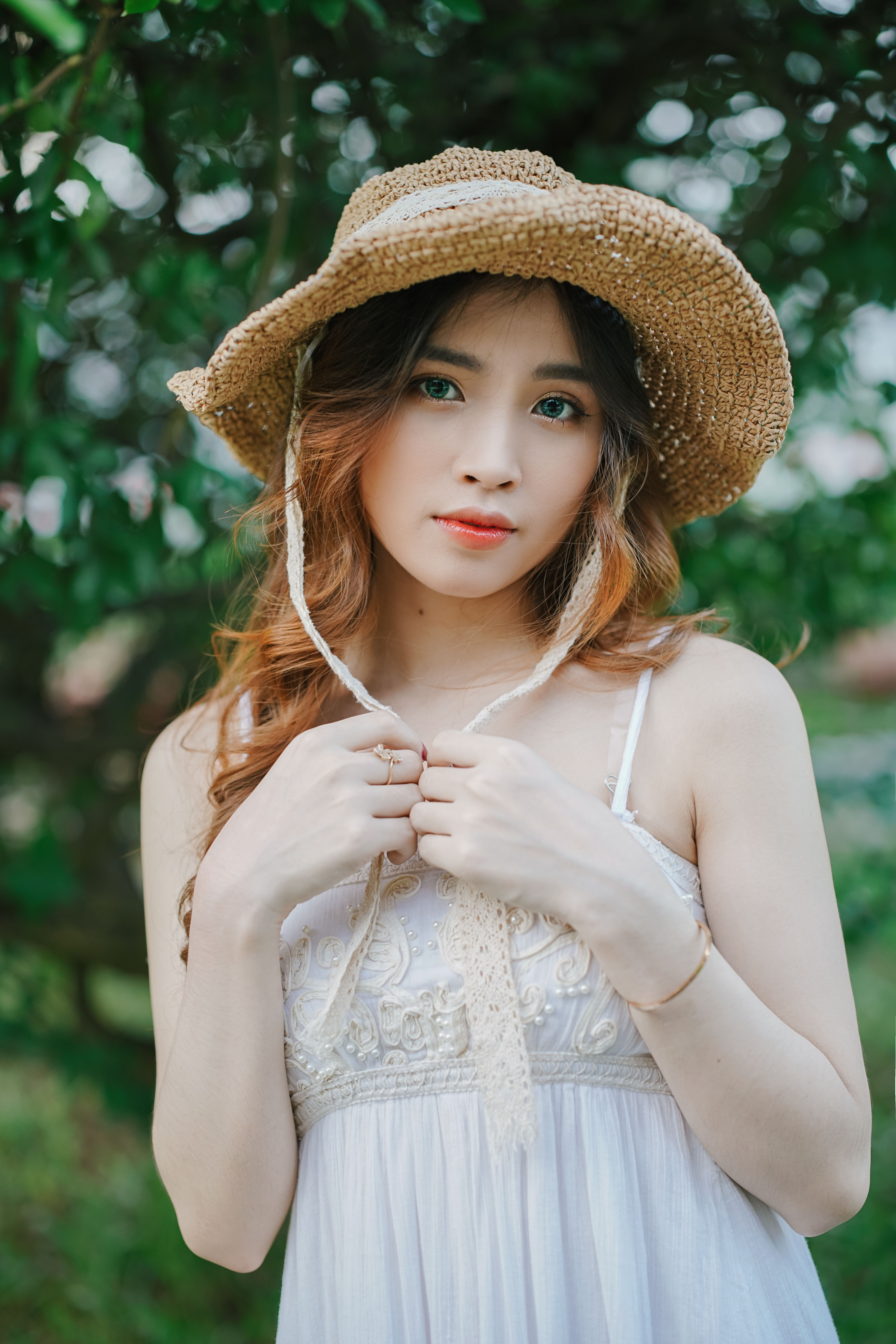 Woman Wearing Brown Bucket Cap · Free Stock Photo