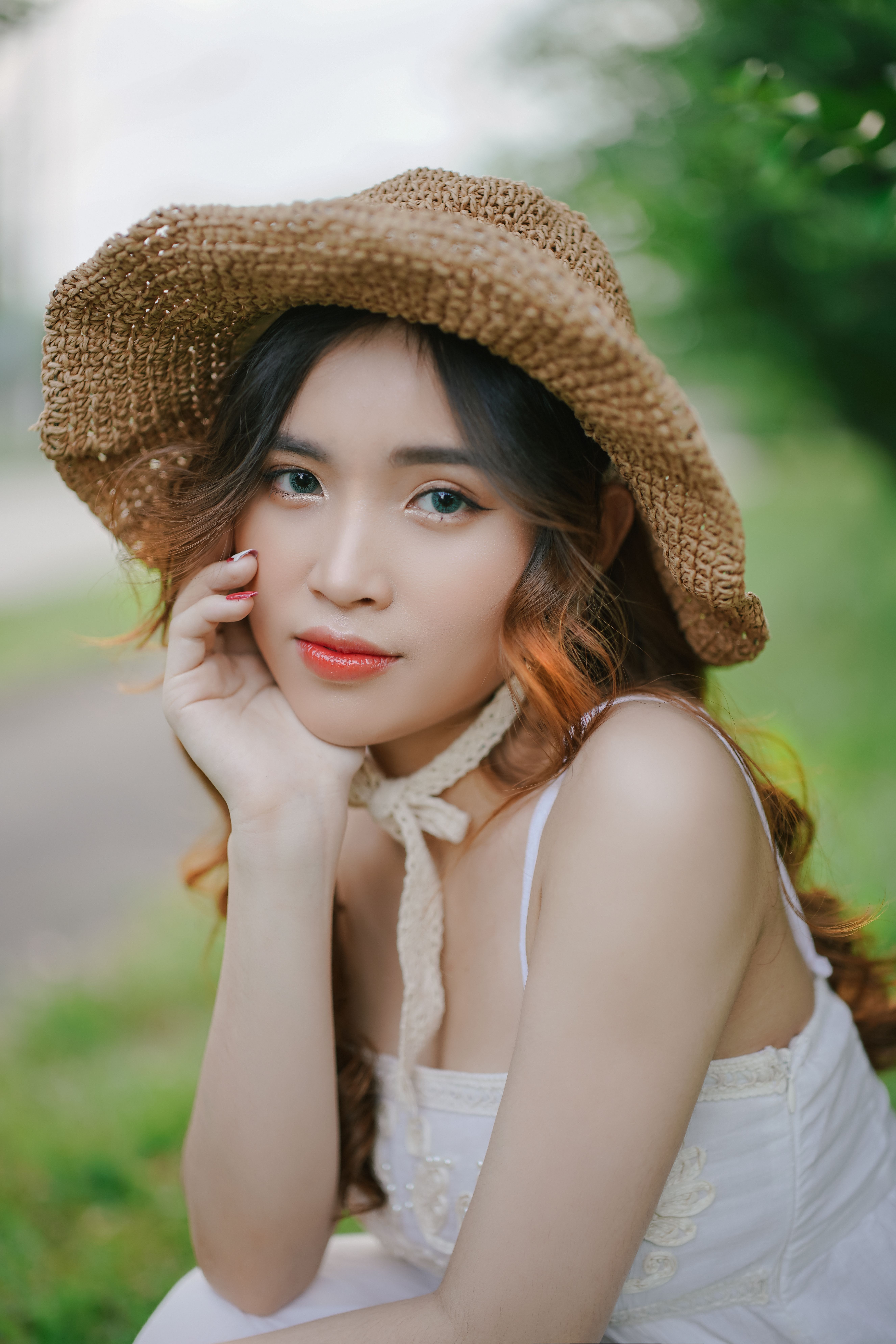 Woman Wearing Brown Bucket Cap · Free Stock Photo