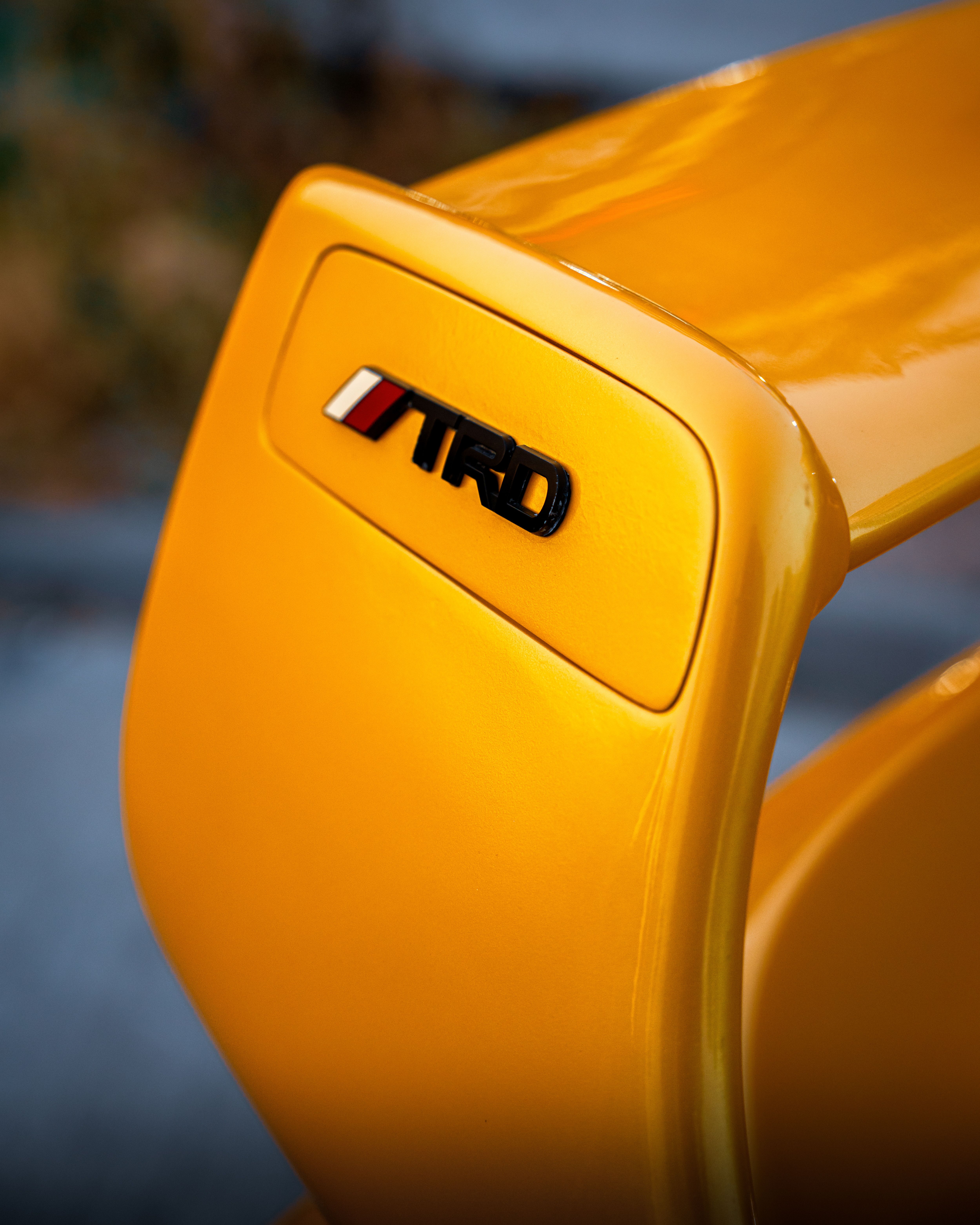 Close-Up of Yellow TRD Car Detail · Free Stock Photo