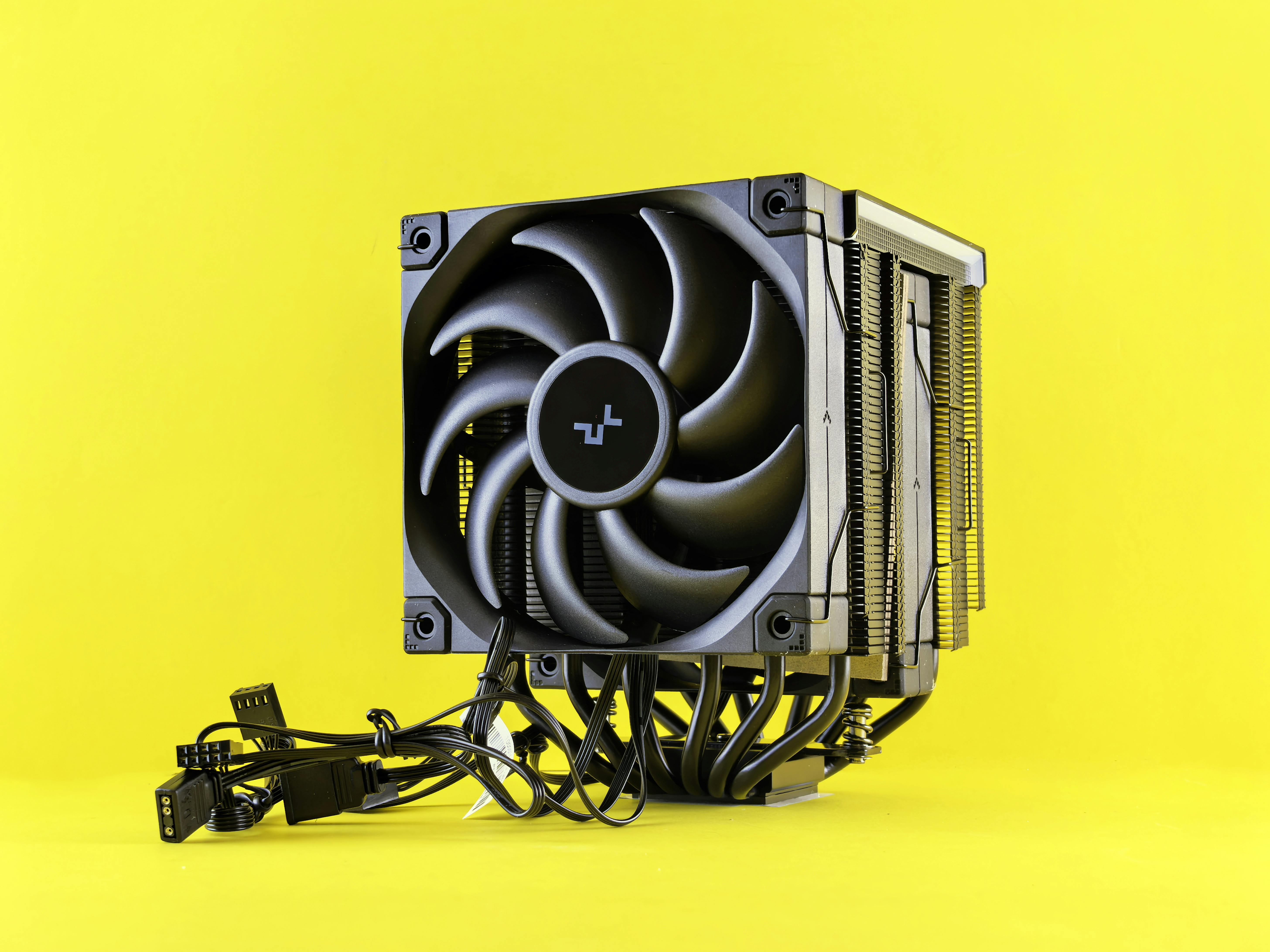High-Performance CPU Cooler on Yellow Background · Free Stock Photo