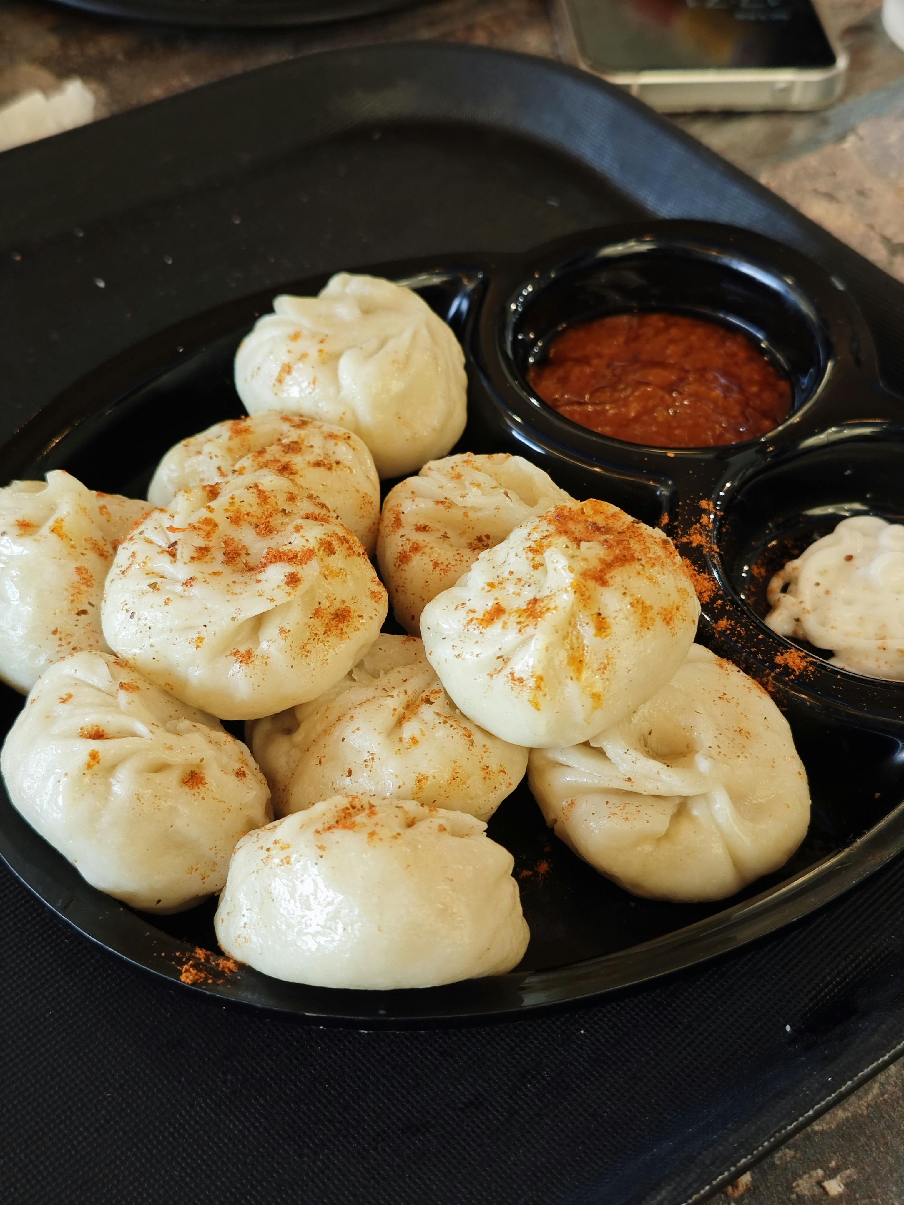 Delicious Steamed Momos with Spicy Chutney · Free Stock Photo