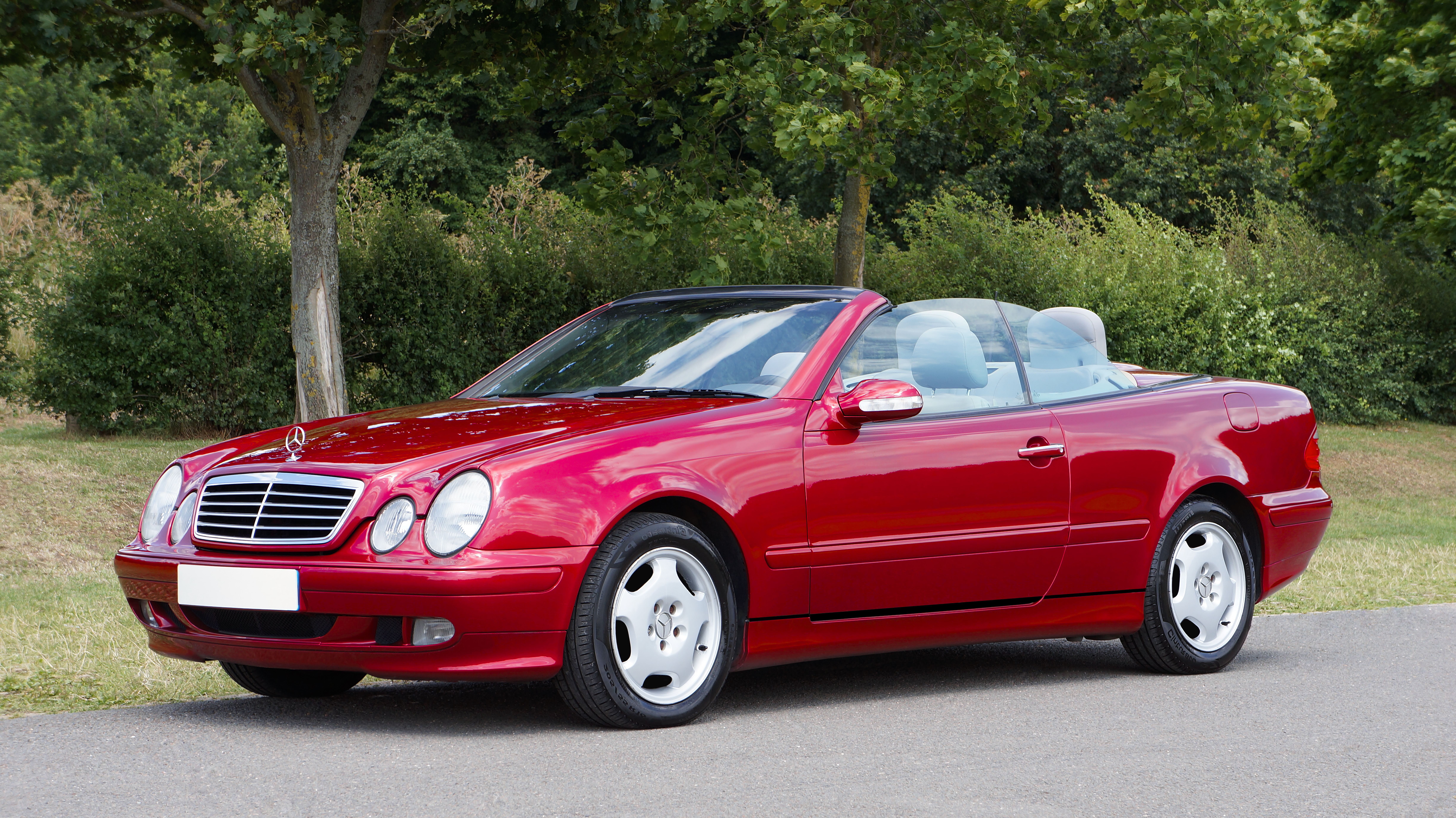 Red Convertible Car Parked in English Countryside · Free Stock Photo