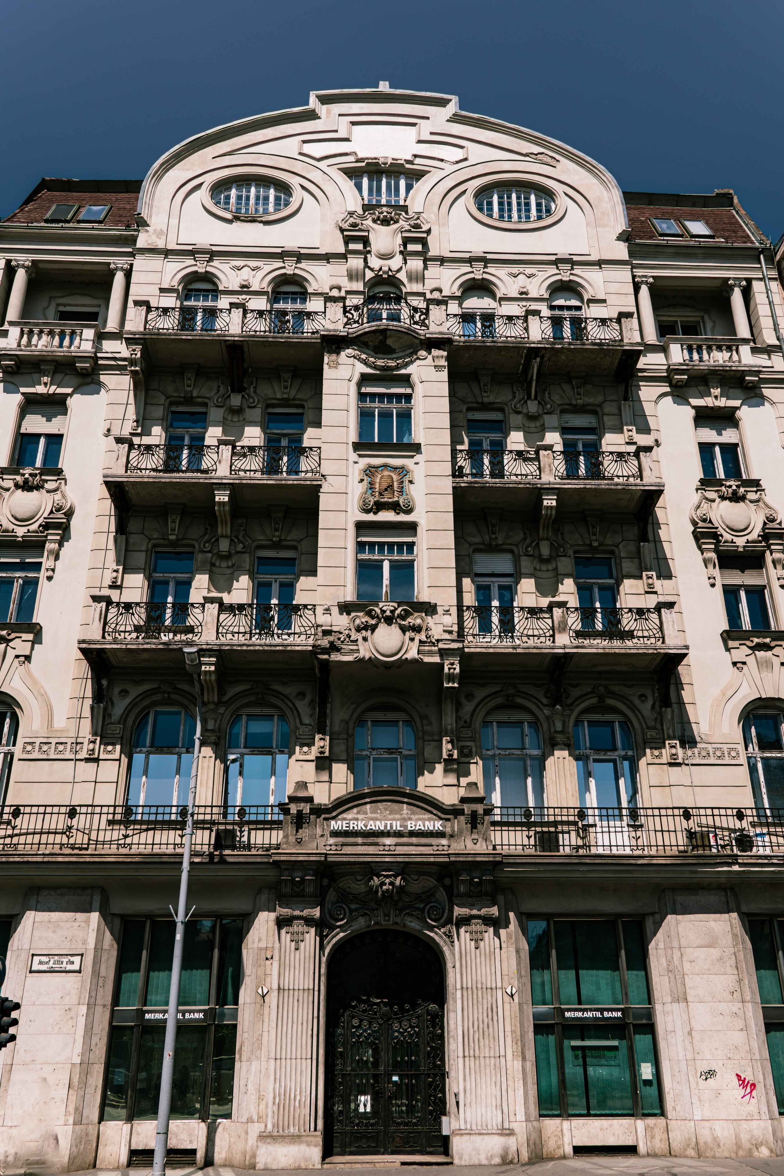 Historic European Bank Building with Detailed Facade · Free Stock Photo