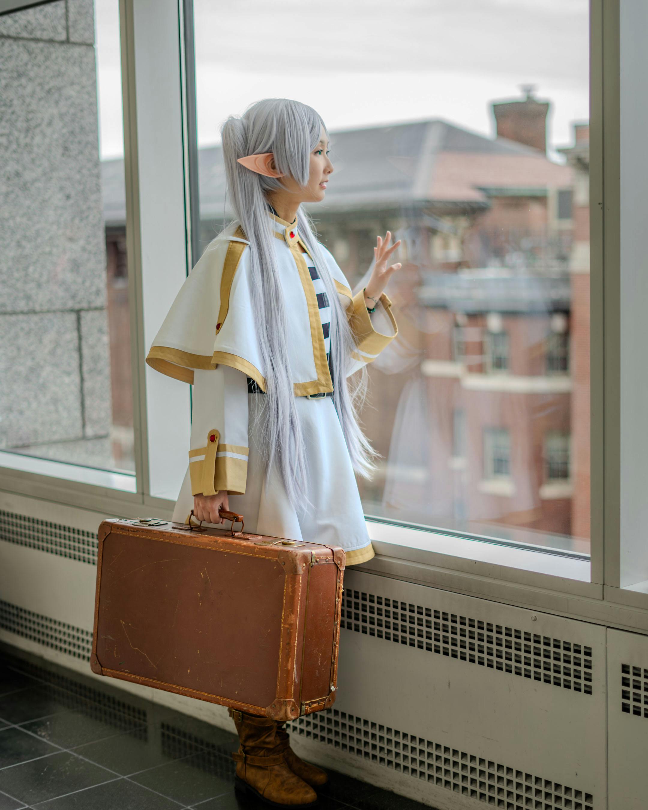 Fantasy Cosplay with Vintage Suitcase by Window · Free Stock Photo