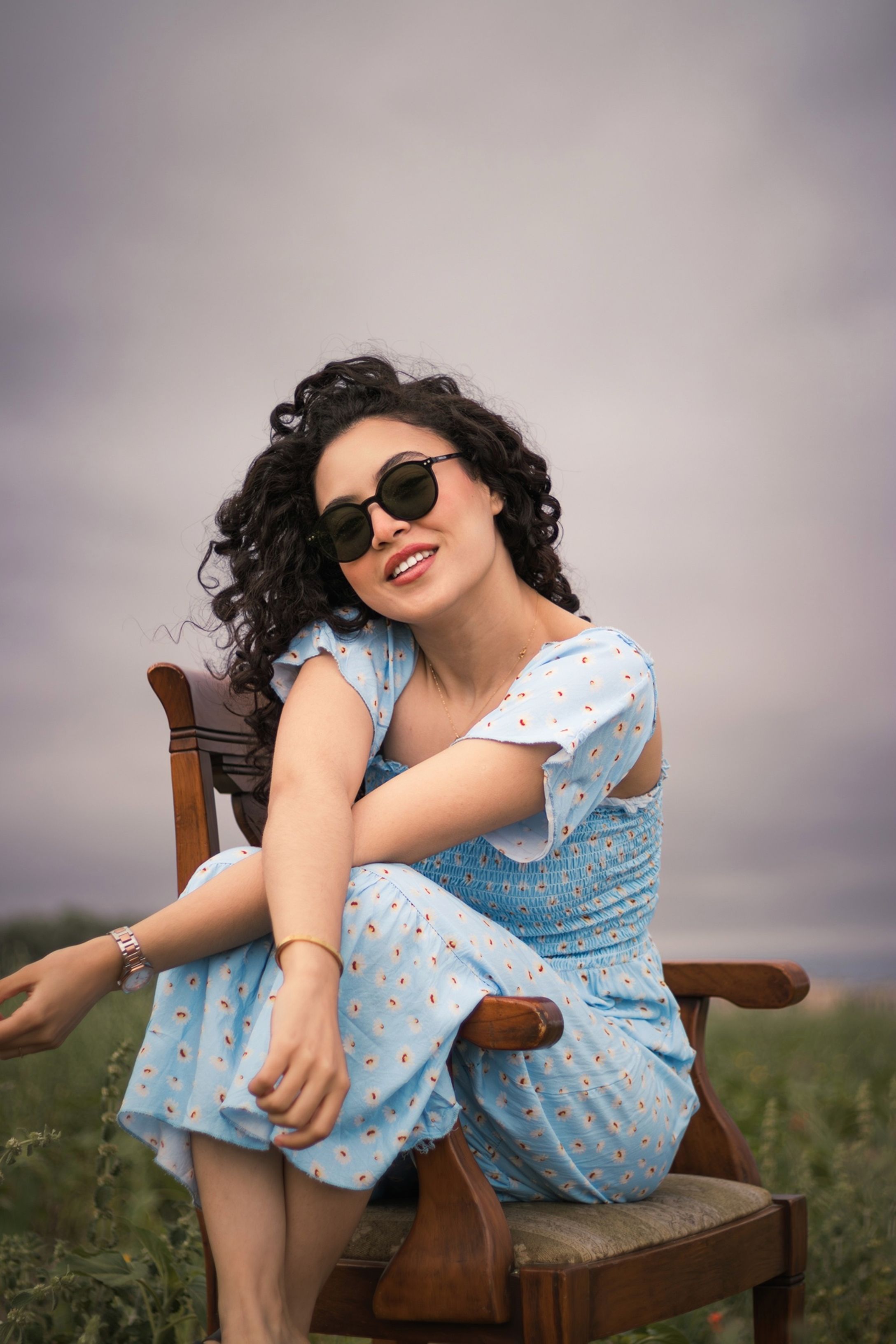 Woman Smiling in Blue Dress Outdoors · Free Stock Photo