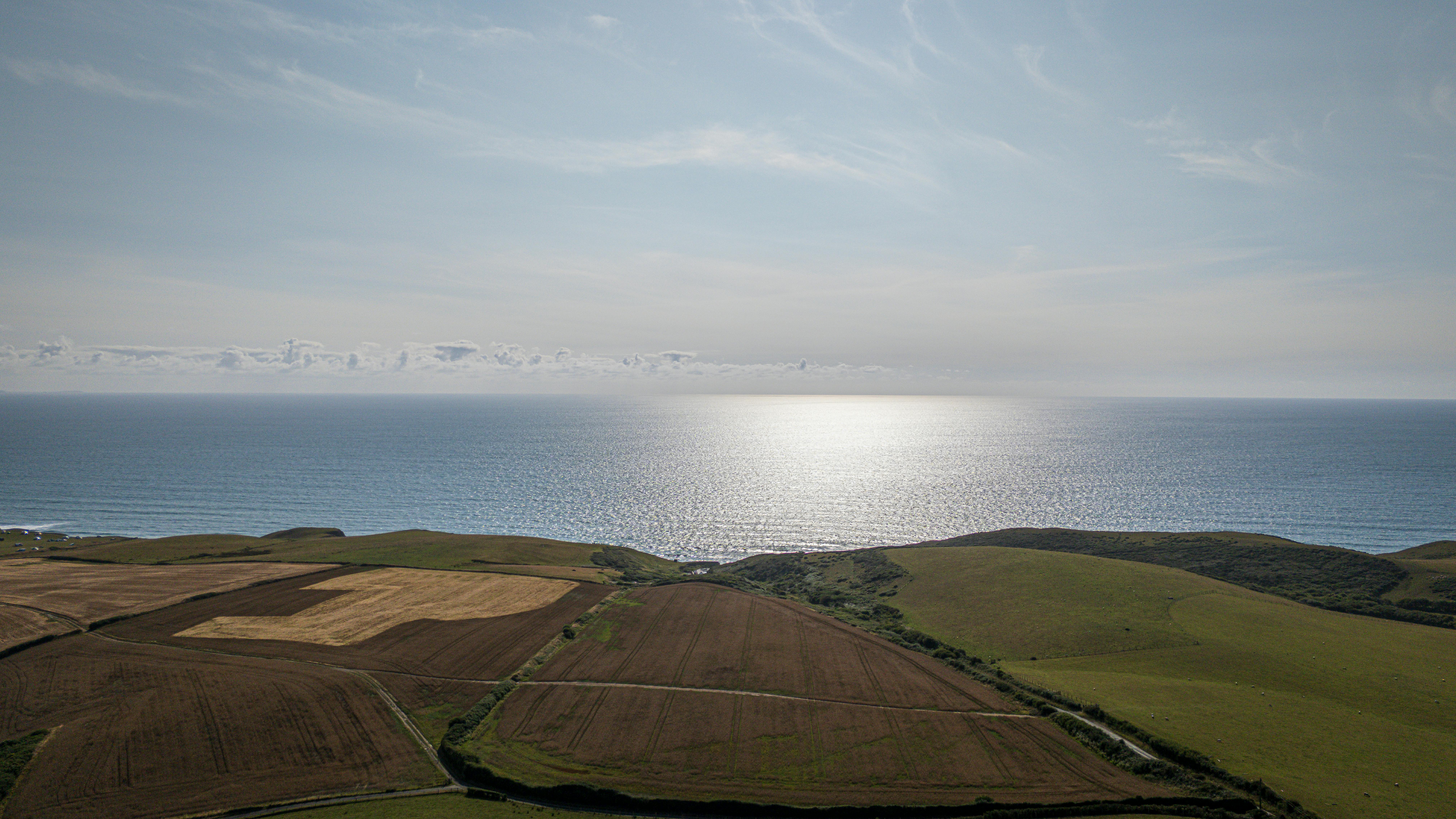 Aerial View of Bude Coastline and Fields, Cornwall · Free Stock Photo