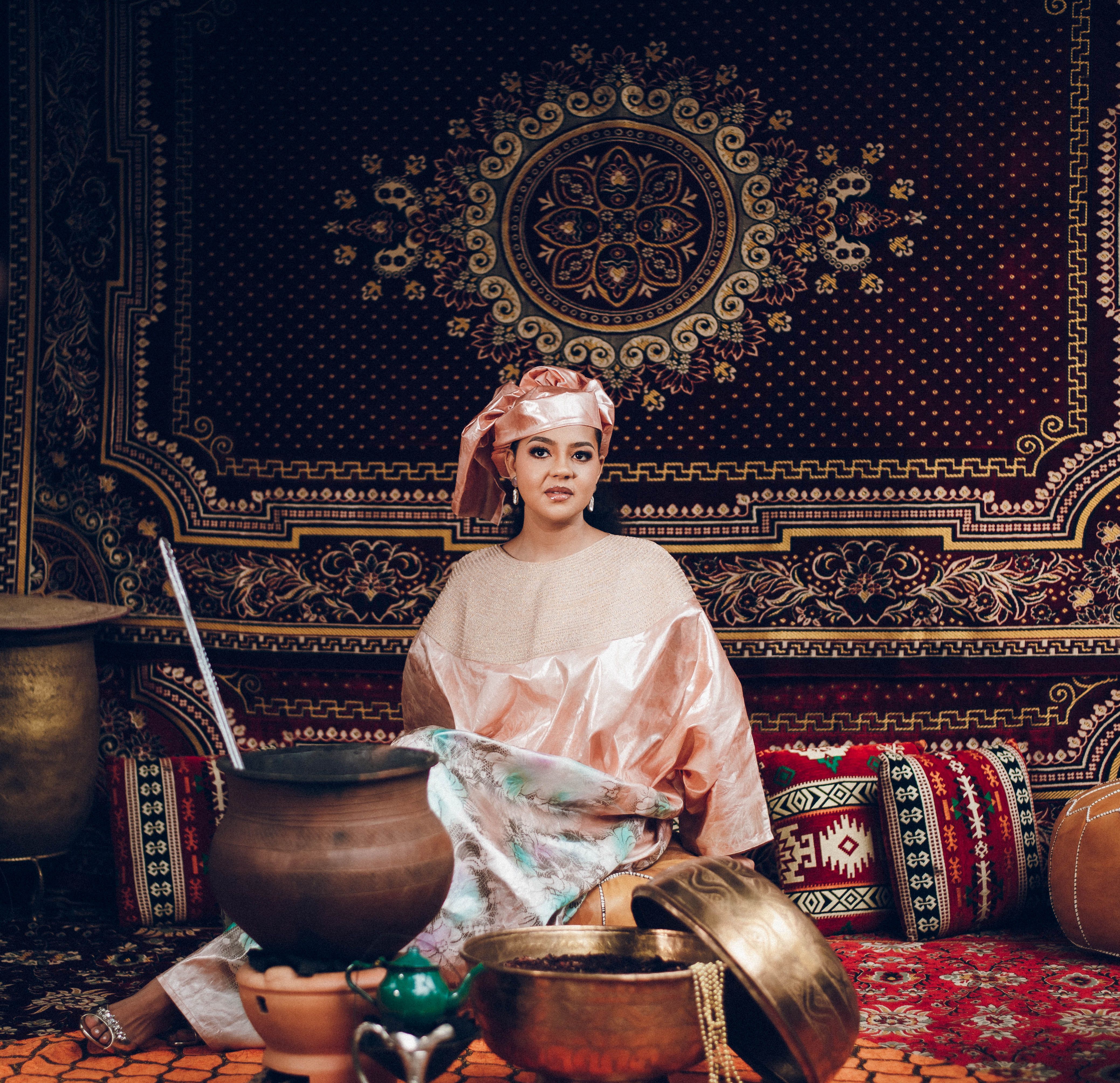 Woman in Traditional Dress with Ornamental Background · Free Stock Photo