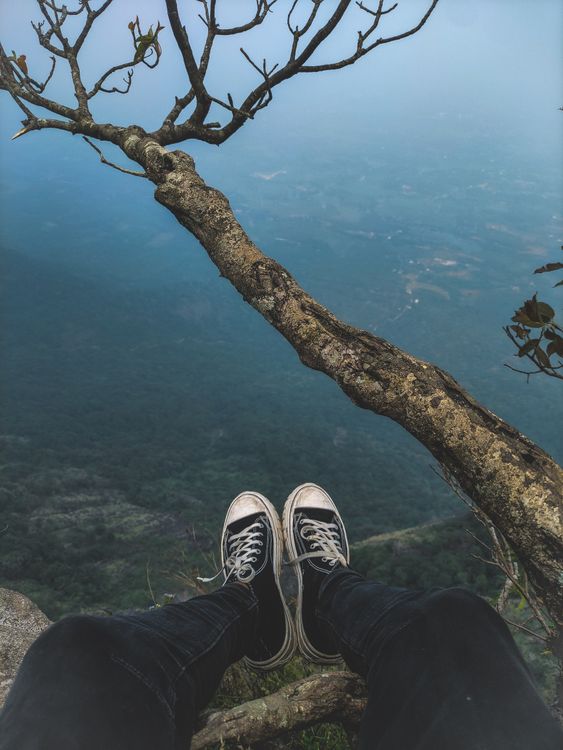 Adventurous View from a Cliffside Perch · Free Stock Photo