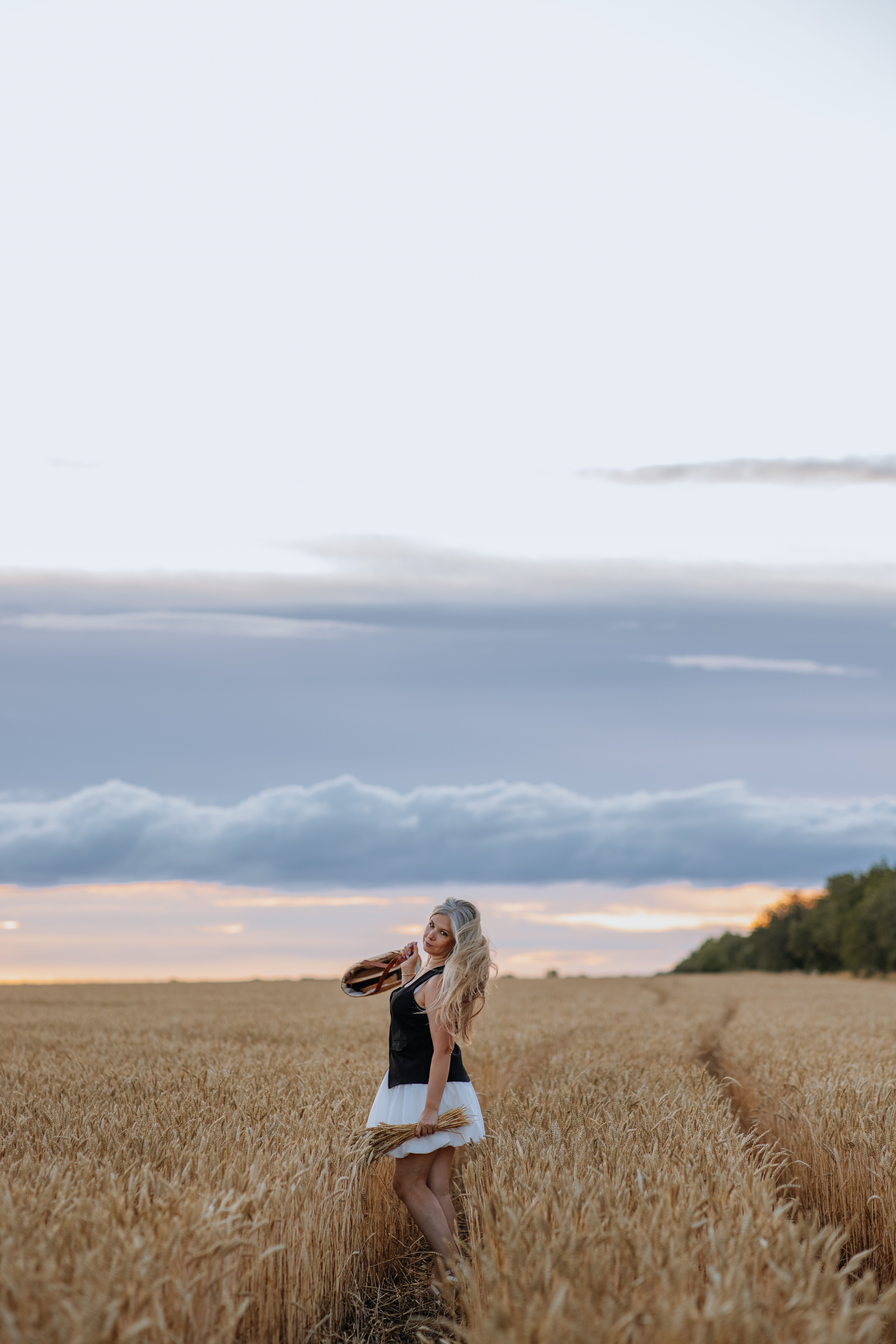 Woman Standing in a Field · Free Stock Photo