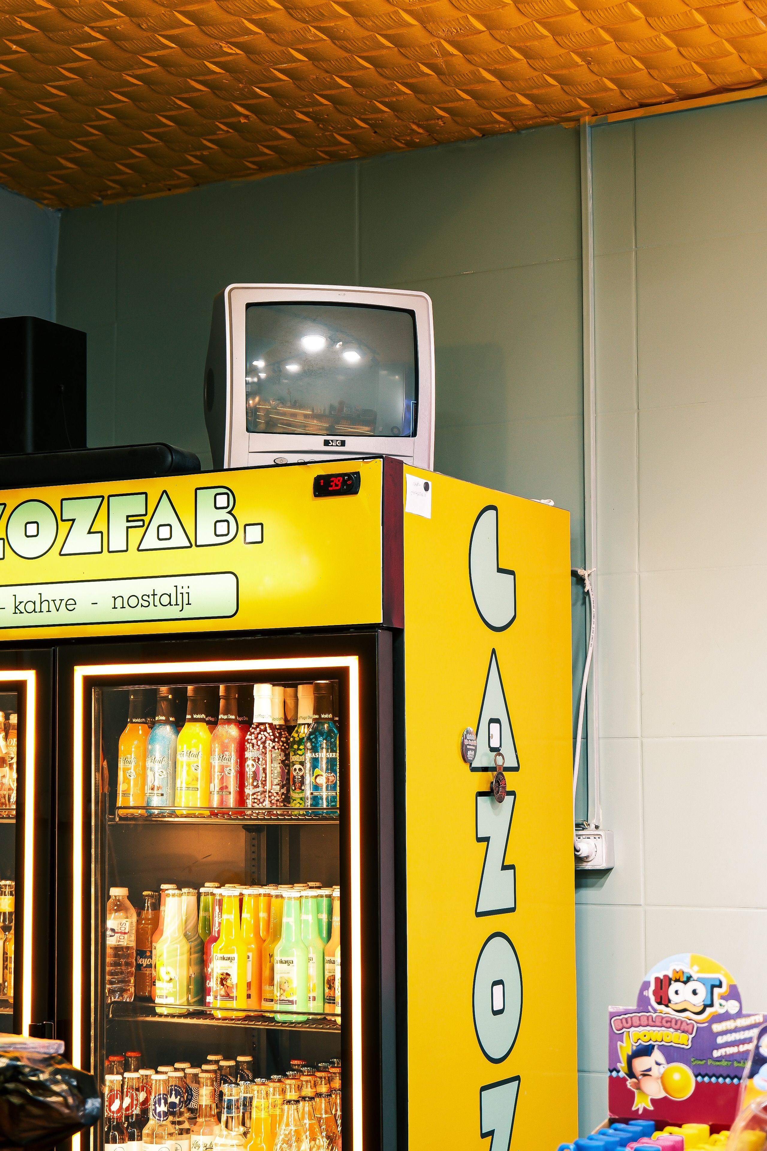 Retro Vending Machine with Vintage TV on Top · Free Stock Photo