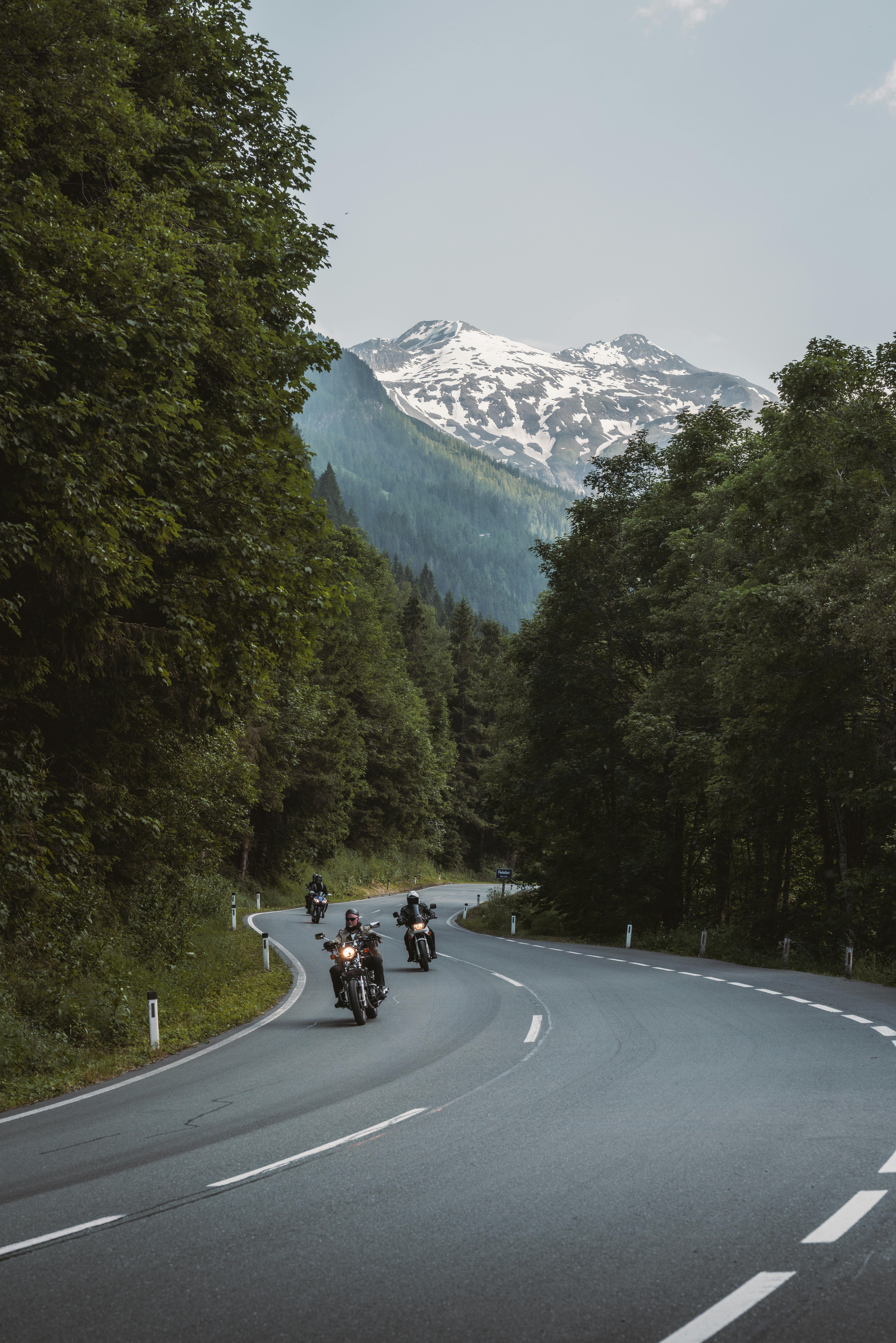 Scenic Motorcycle Ride Through Mountain Pass · Free Stock Photo