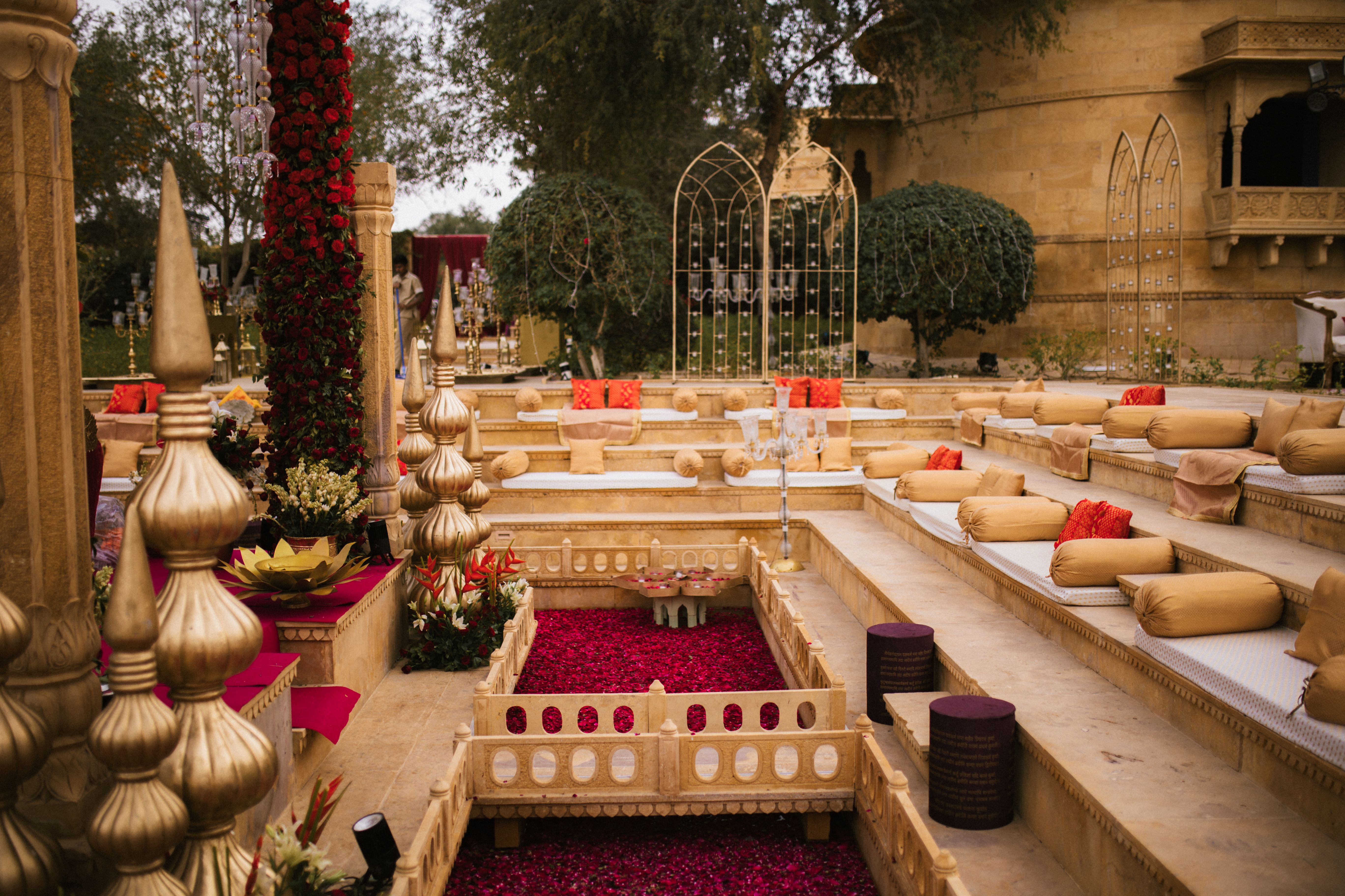 Elegant Outdoor Indian Wedding Setup with Roses · Free Stock Photo