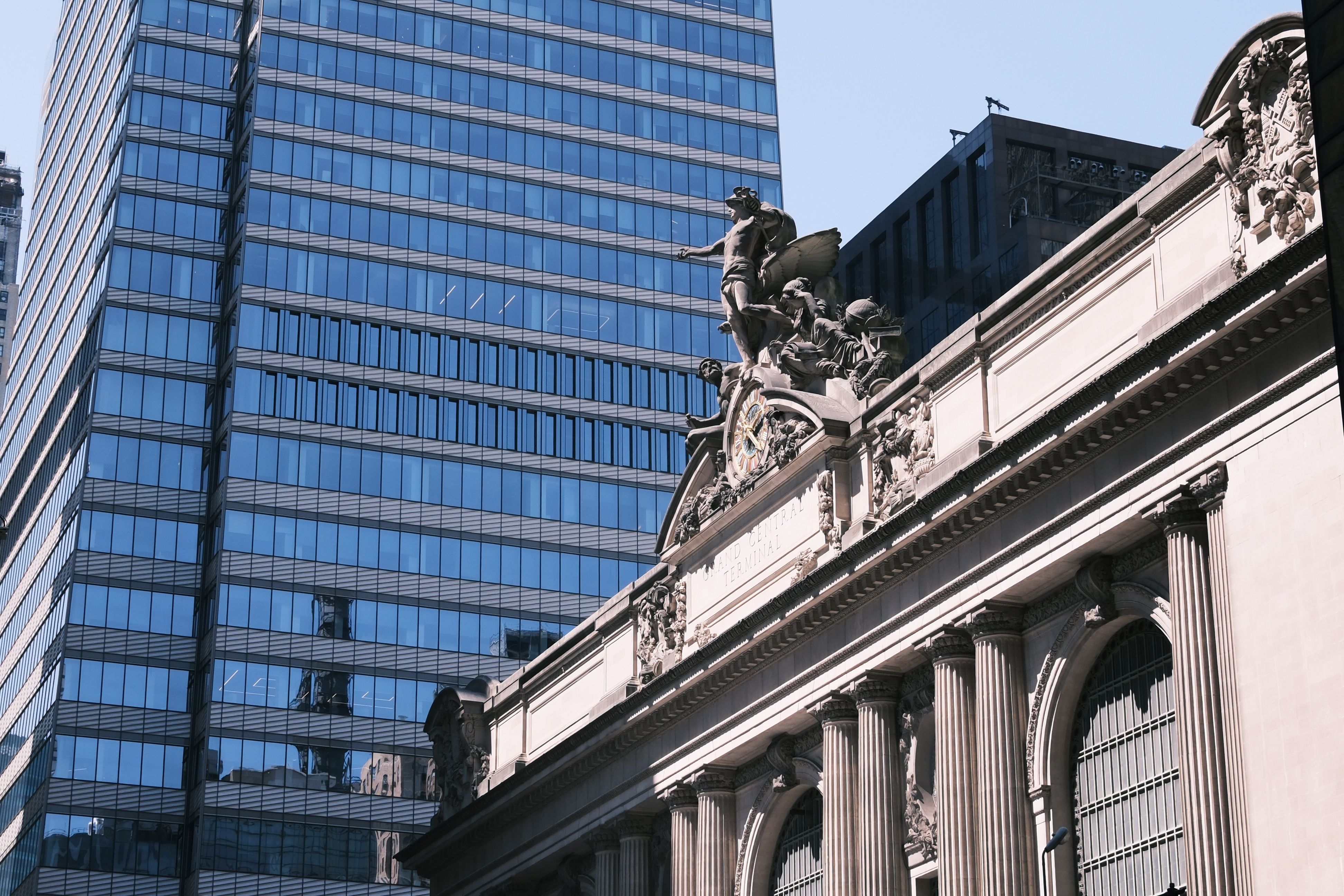 Majestic stone building near glass skyscraper in downtown · Free Stock ...