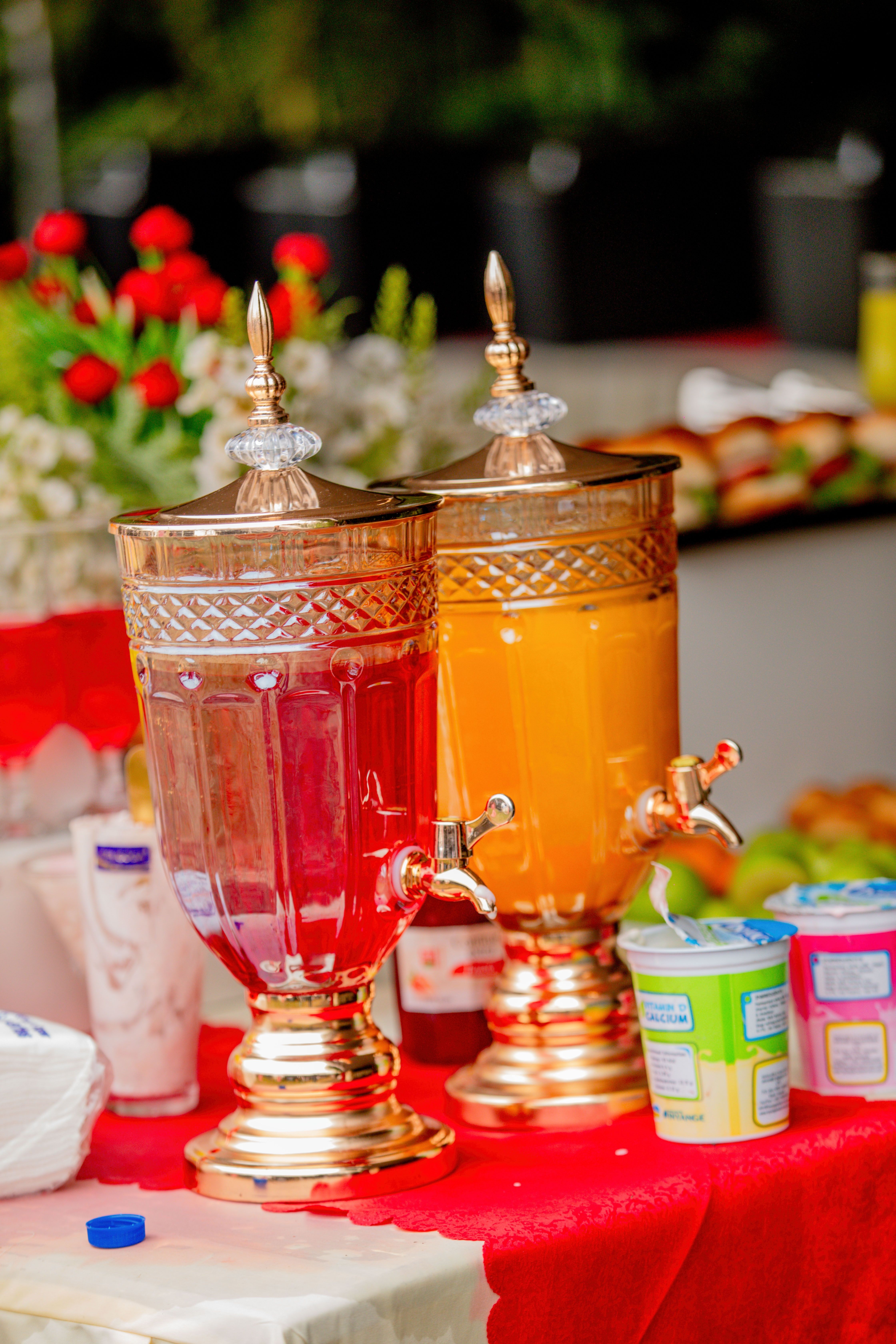 Elegant Beverage Dispensers at Outdoor Event · Free Stock Photo