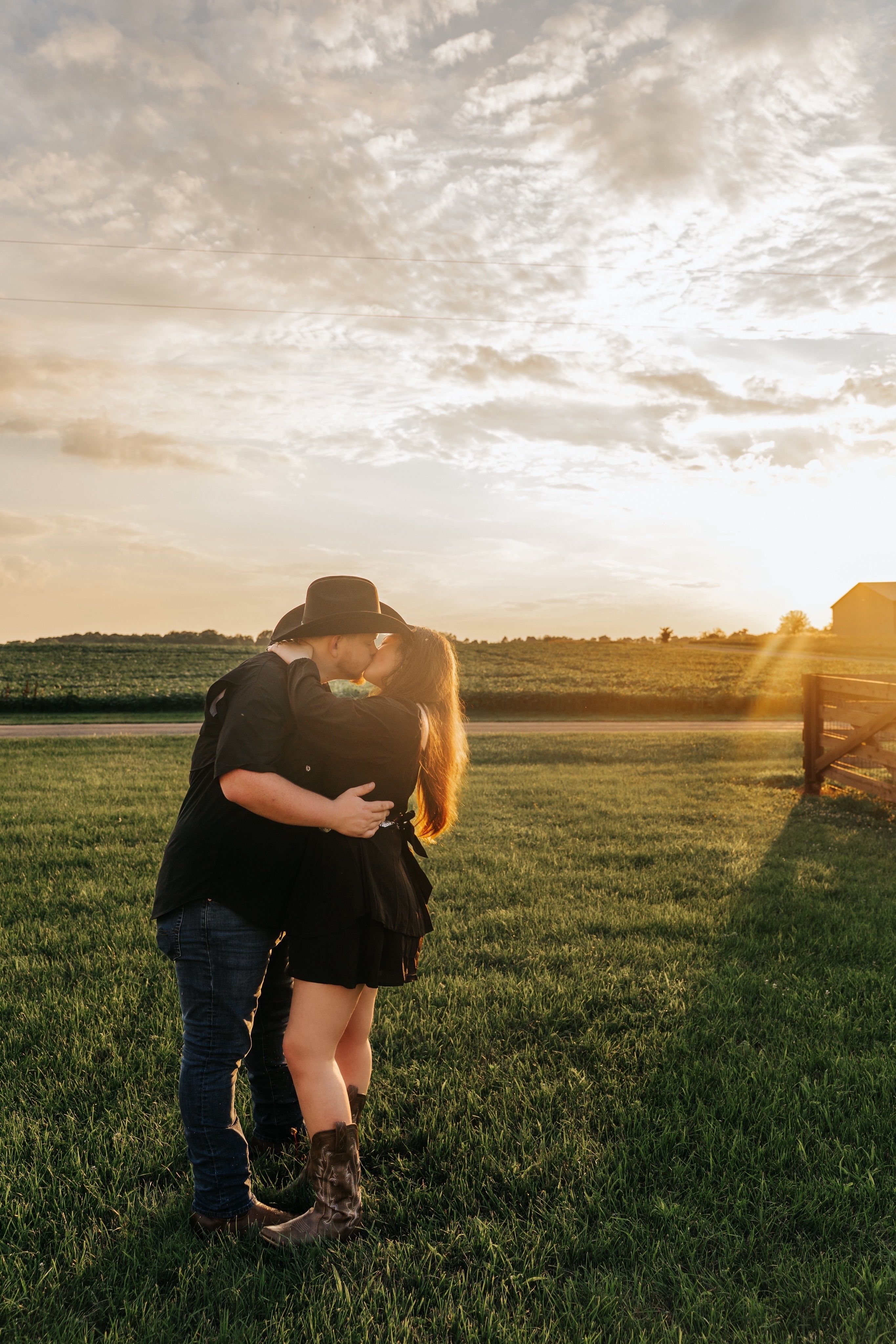 Romantic Sunset Kiss on the Farm · Free Stock Photo