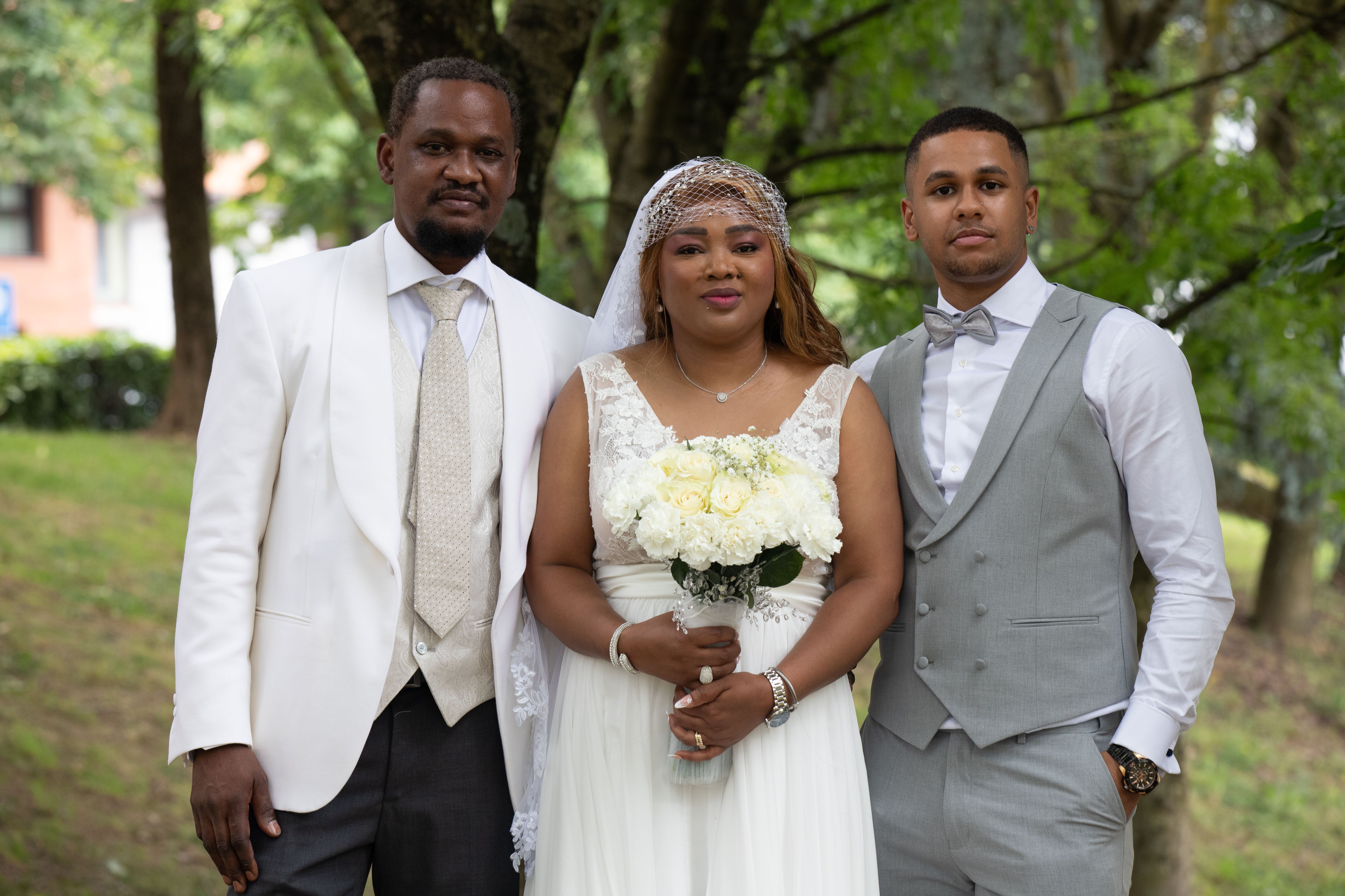 Elegant Outdoor Wedding Portrait in a Park · Free Stock Photo