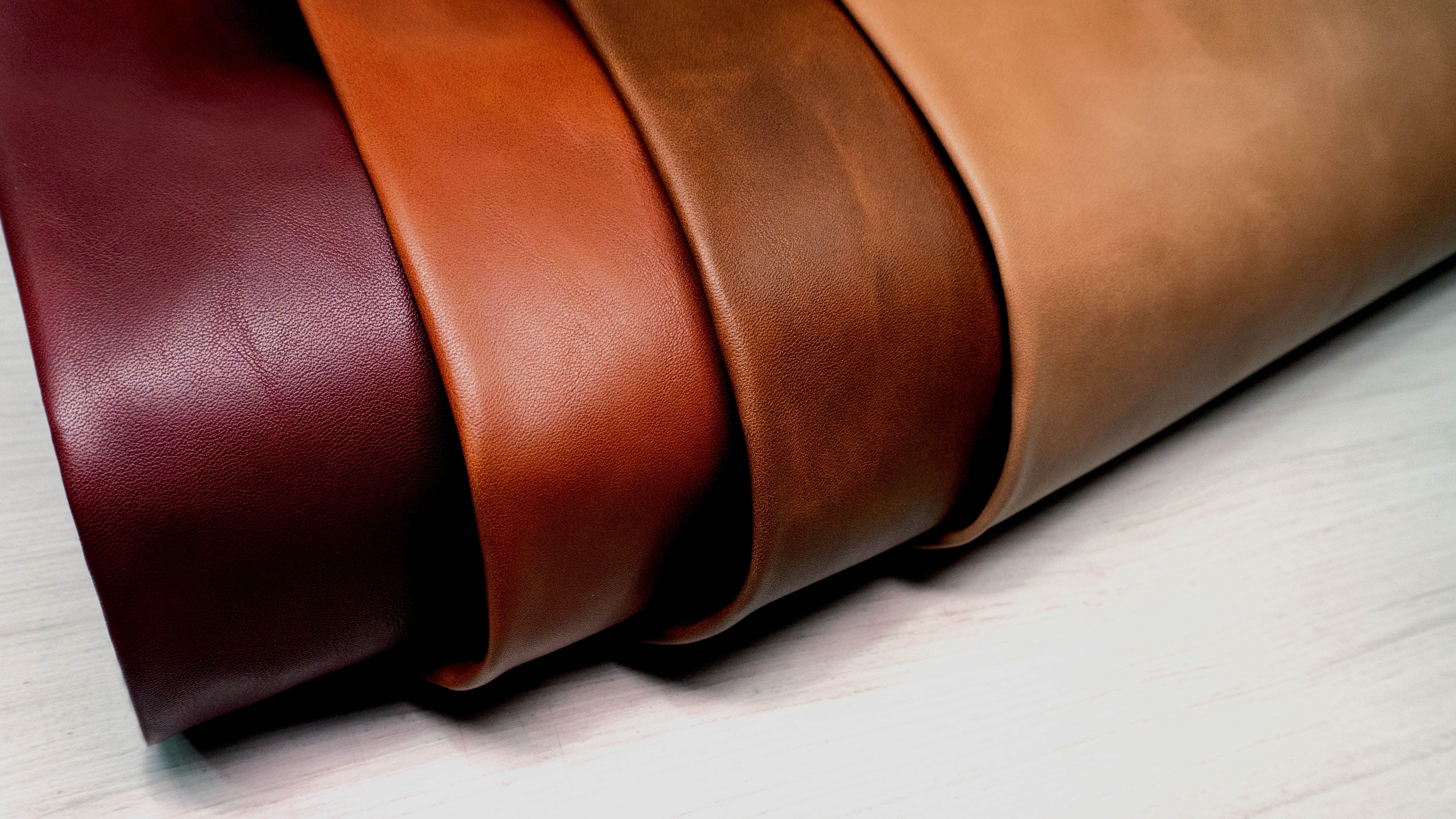 Various Shades of Quality Leather Rolls Displayed · Free Stock Photo